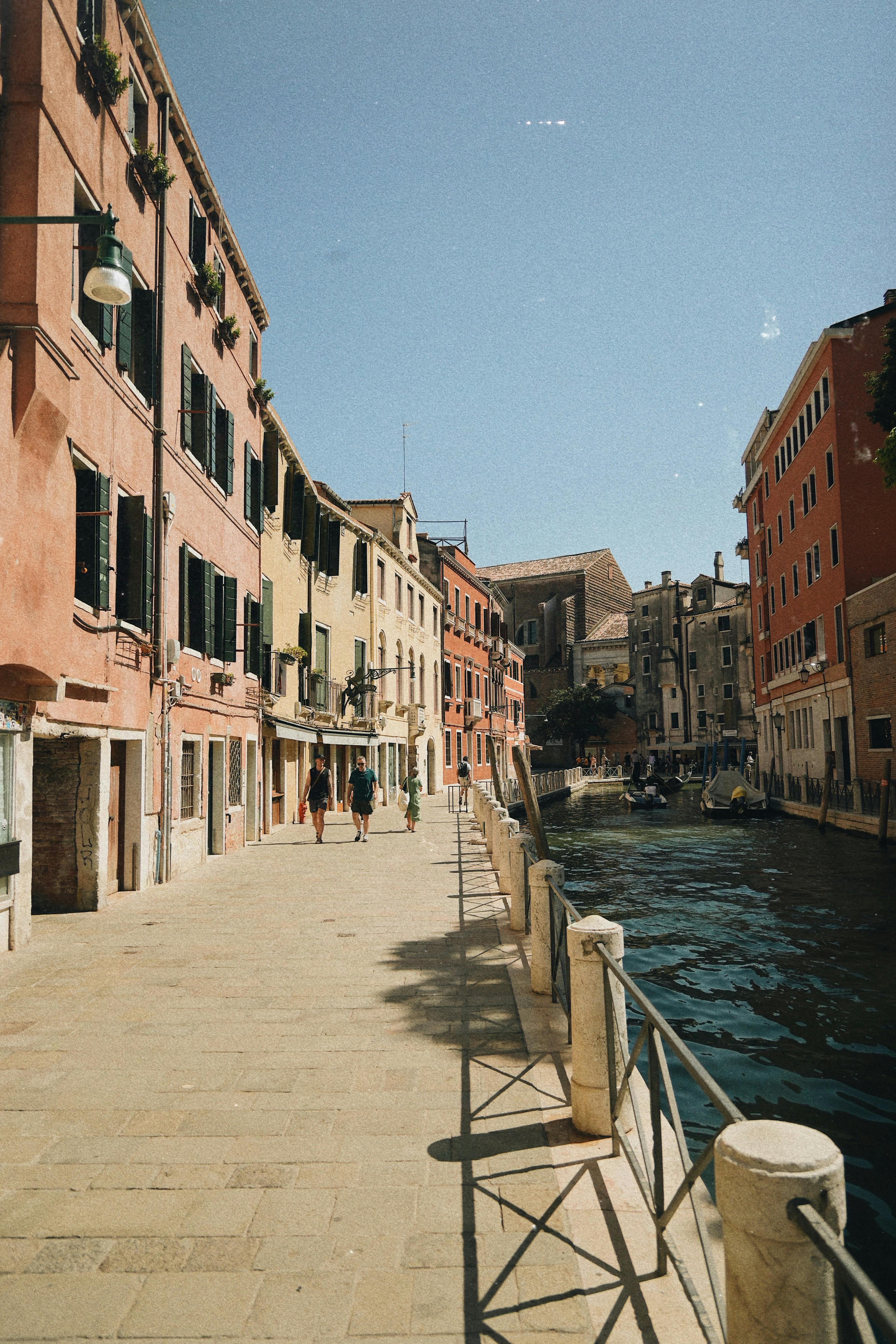 Sunny Canal Walkway in Venice, Italy · Free Stock Photo