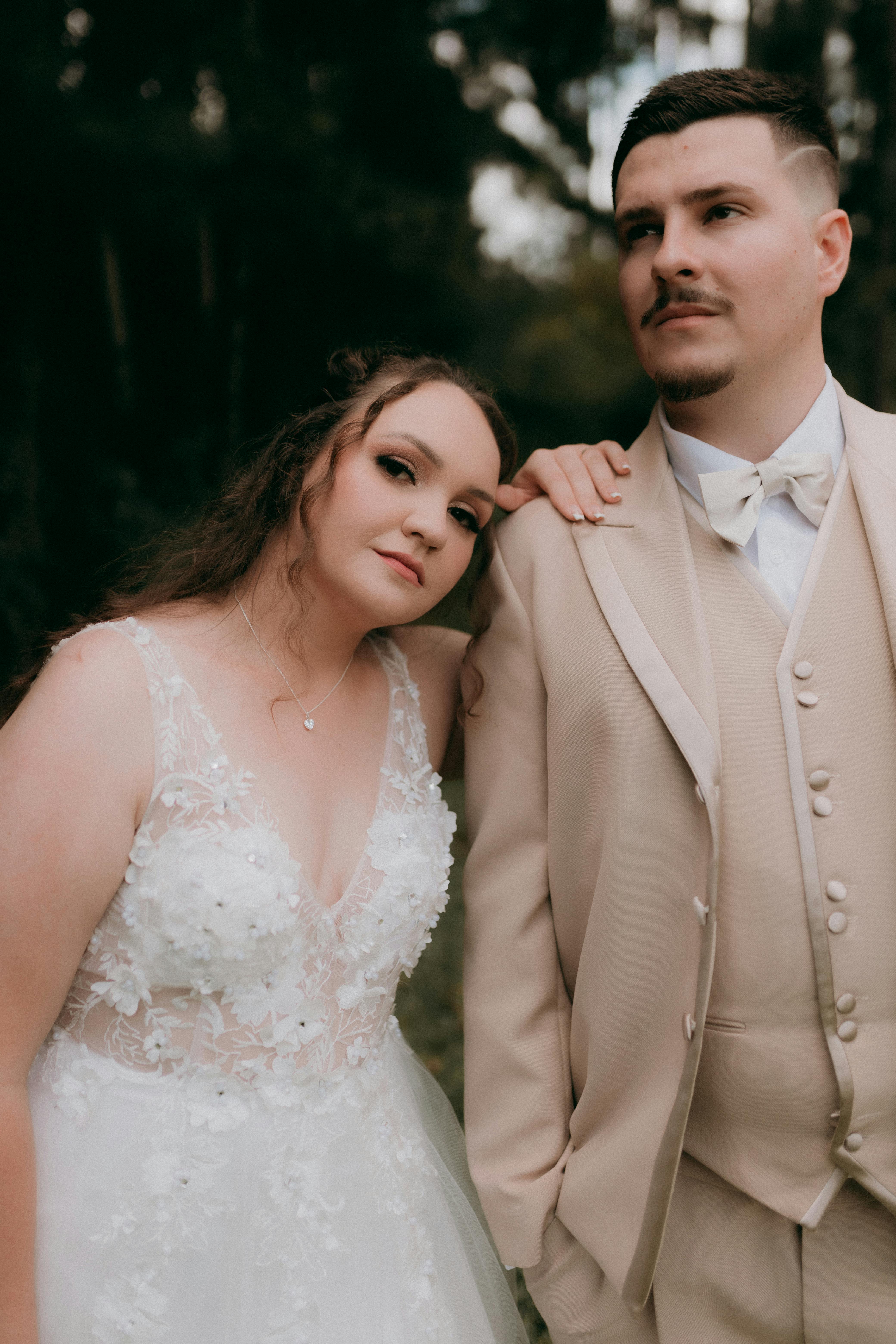 Elegant Outdoor Wedding Portrait of a Couple · Free Stock Photo