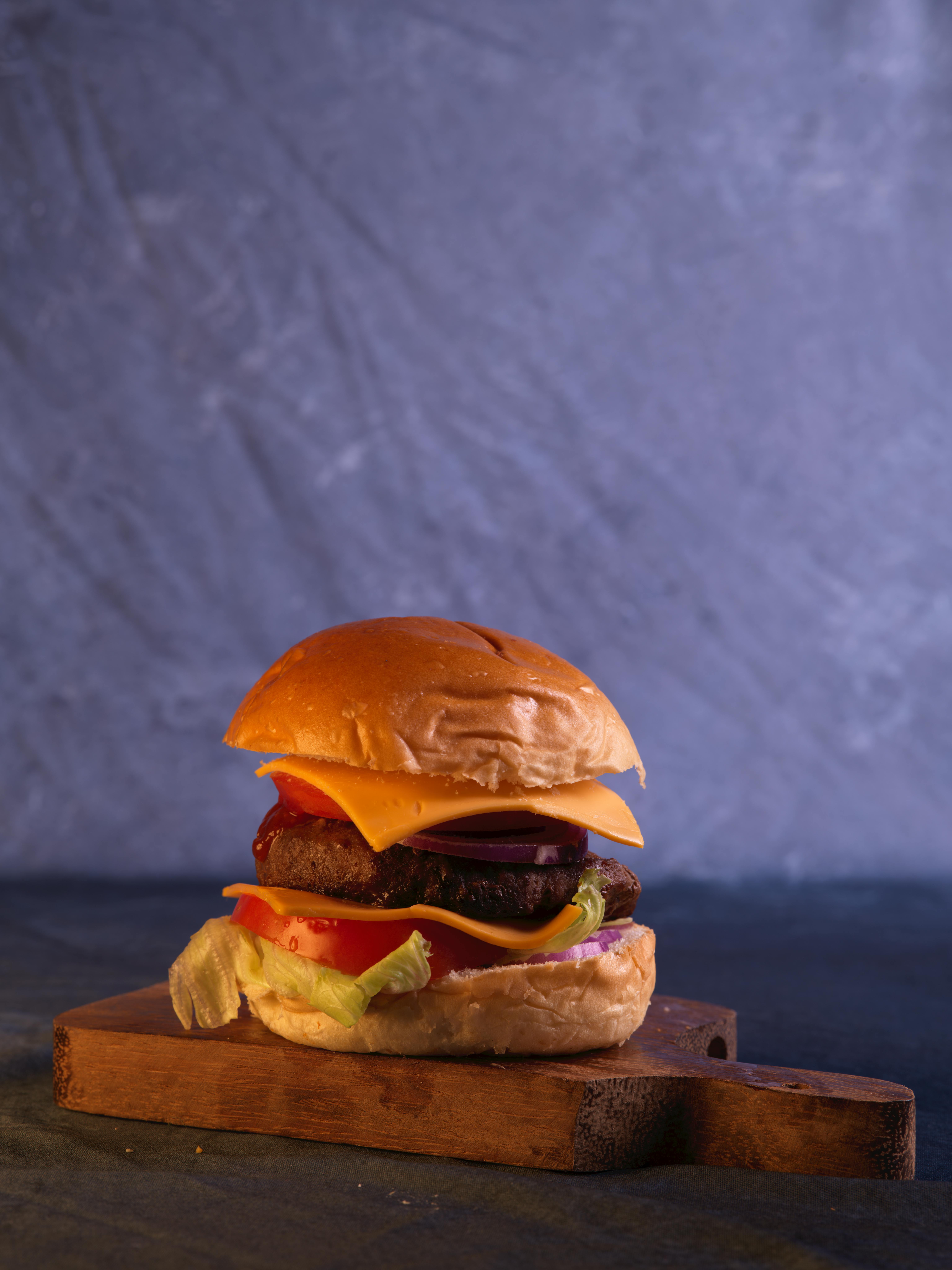 Plate with a Burger on a Kitchen Island · Free Stock Photo