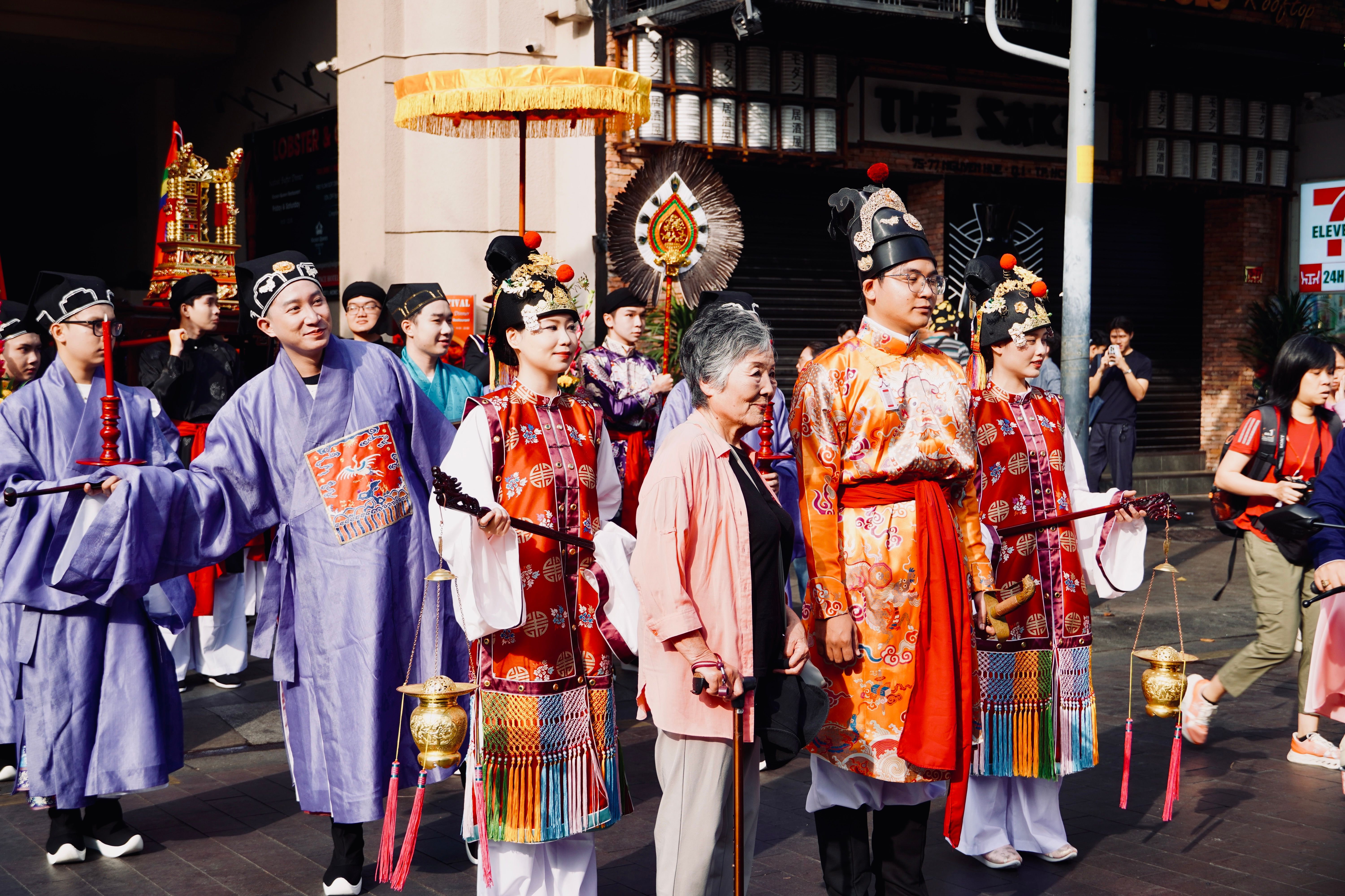 Colorful Cultural Parade with Traditional Costumes · Free Stock Photo