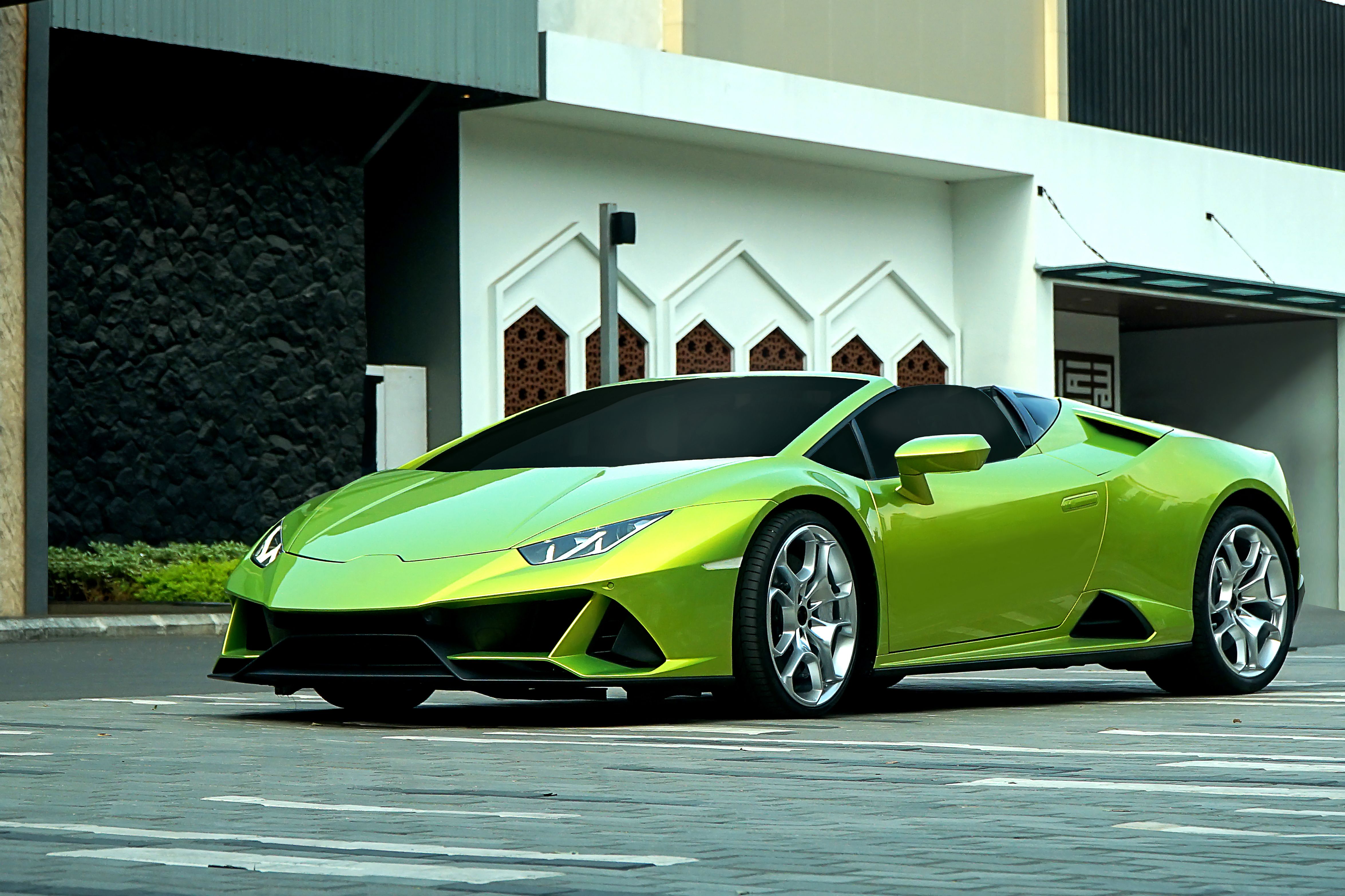 Vibrant Green Lamborghini in Jakarta Street · Free Stock Photo