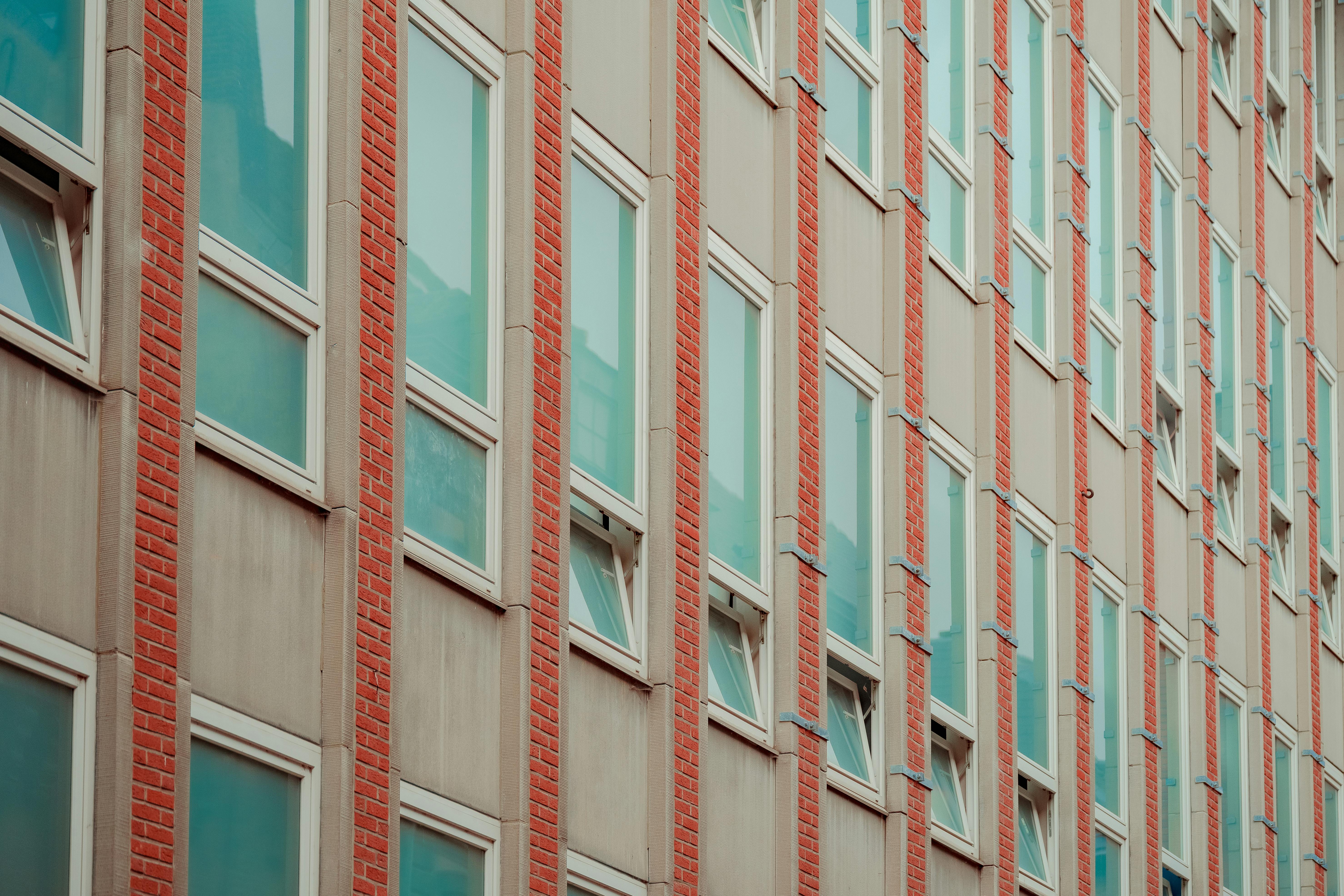Symmetrical Red Brick Building Facade Pattern · Free Stock Photo