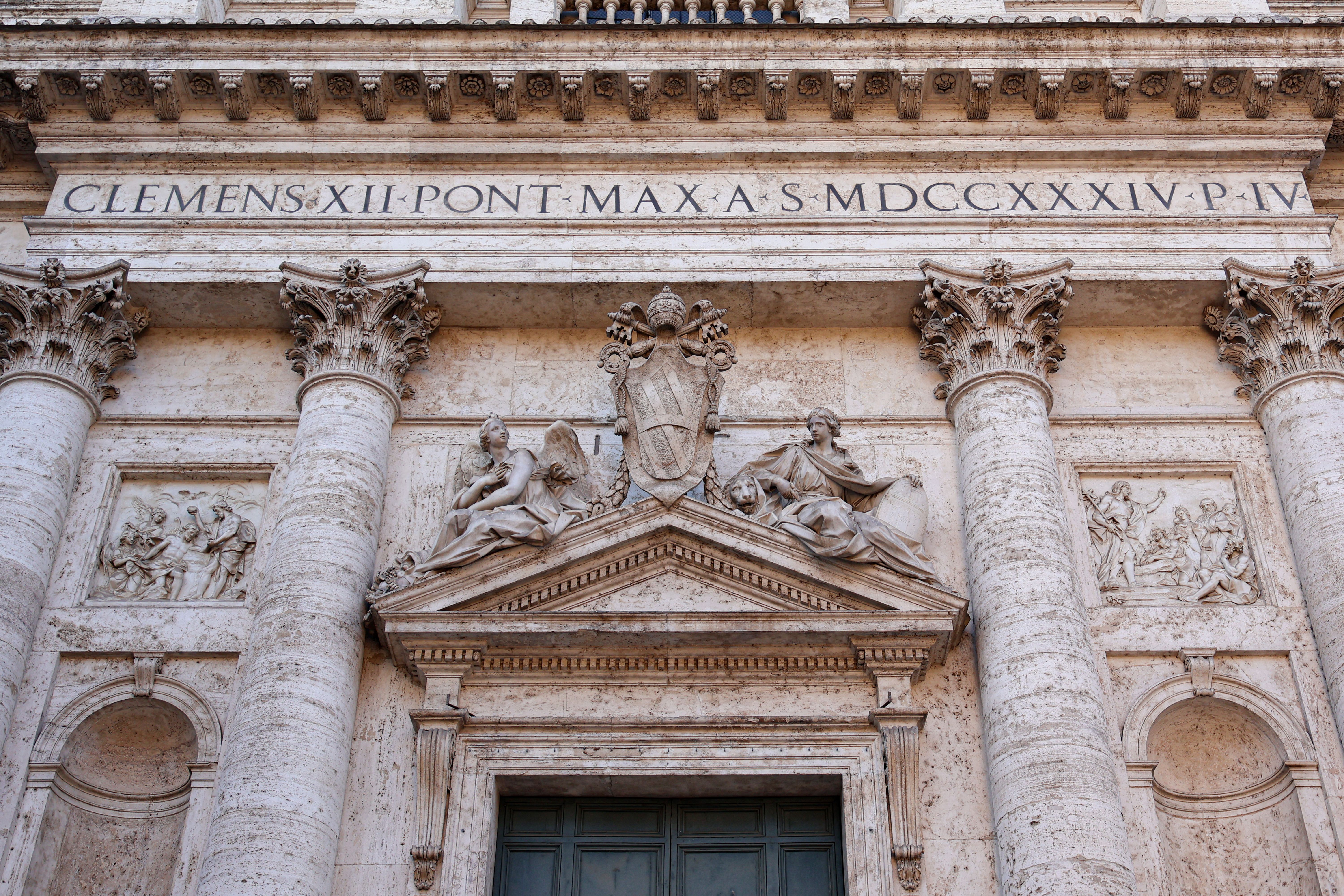Ornate Architectural Details of Roman Church Facade · Free Stock Photo