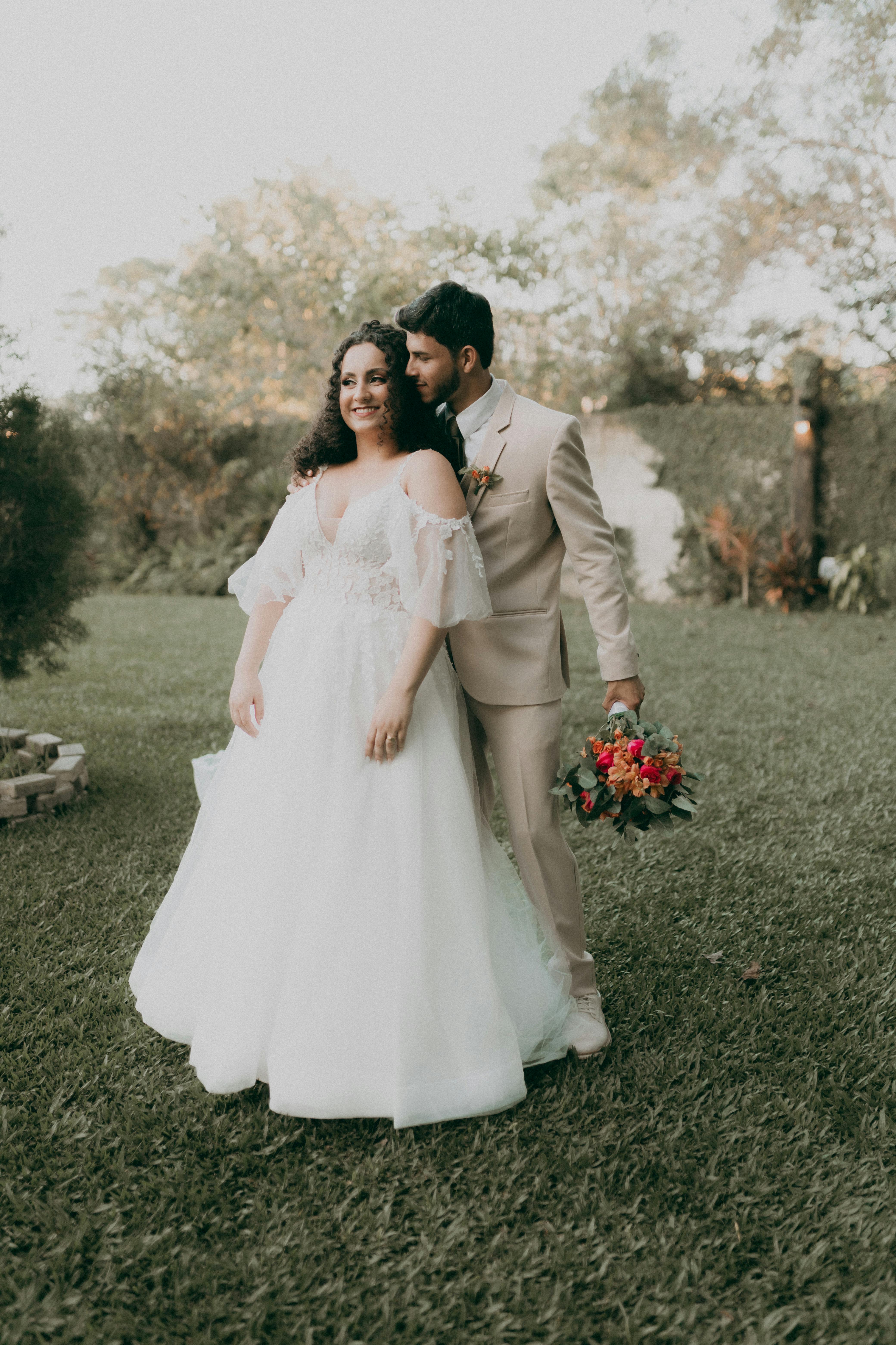 Elegant Outdoor Wedding Portrait of a Couple · Free Stock Photo
