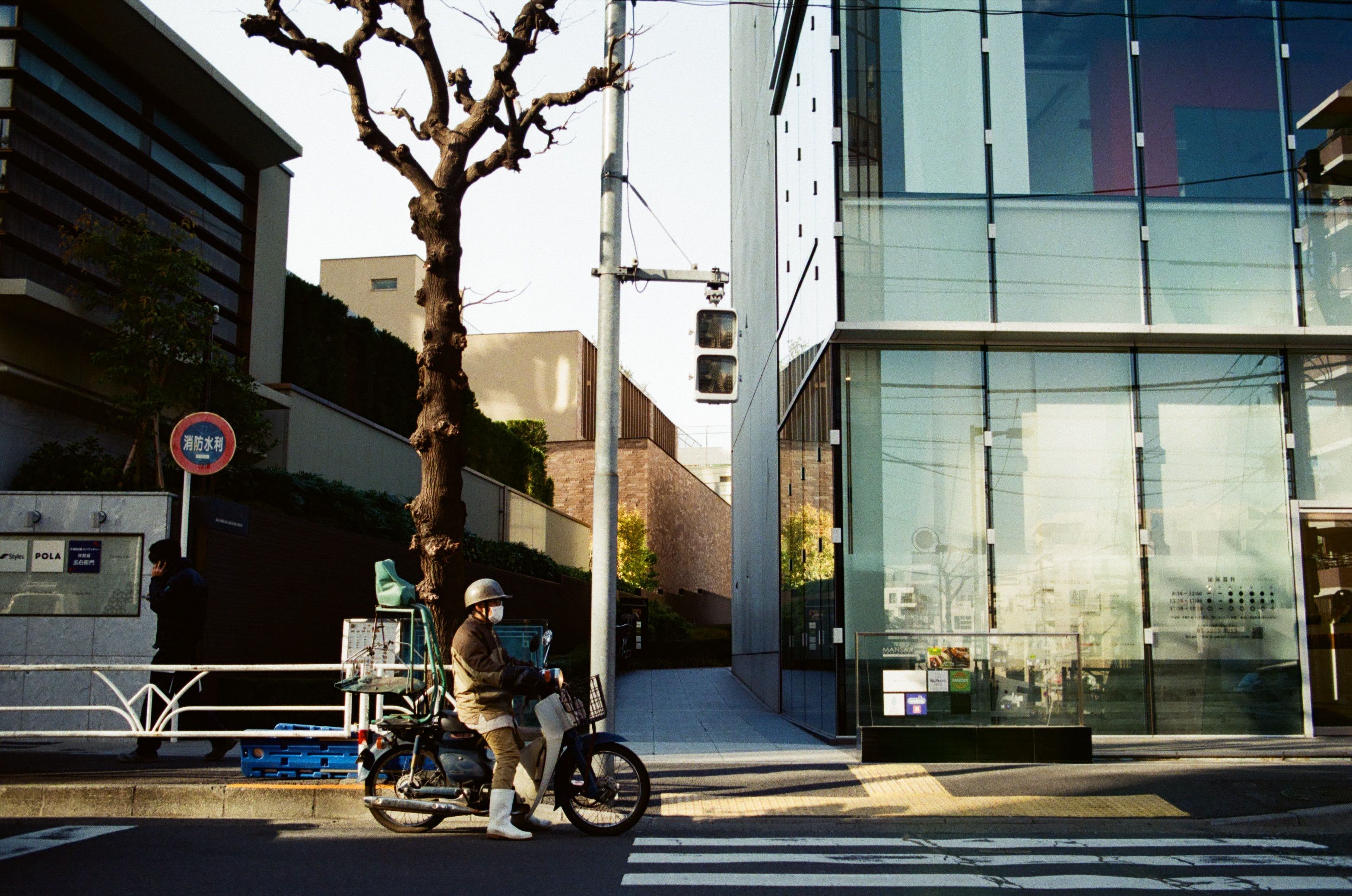 Urban Scene in Tokyo with Electric Bike Rider · Free Stock Photo