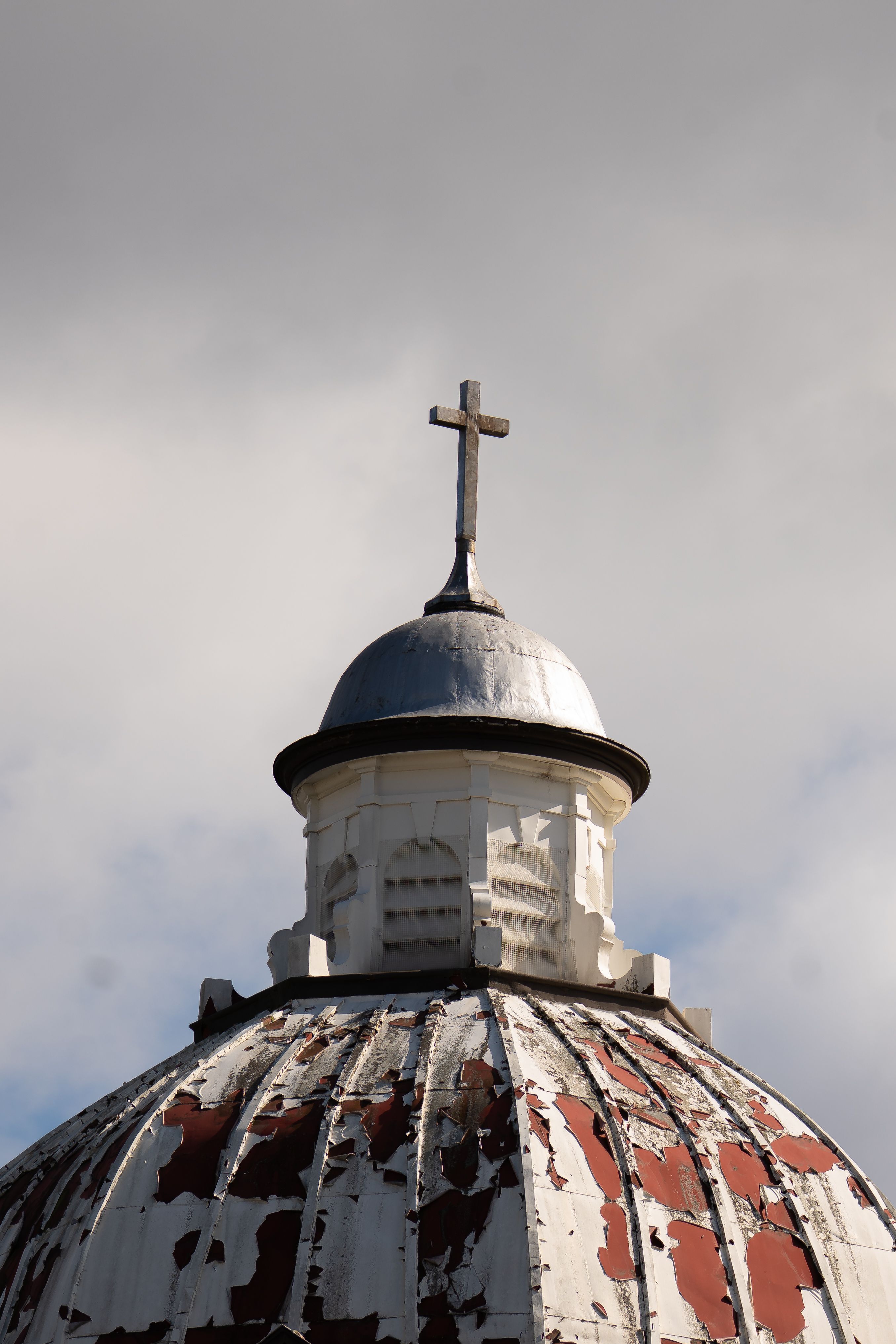 Weathered Church Dome with Cross and Dramatic Sky · Free Stock Photo