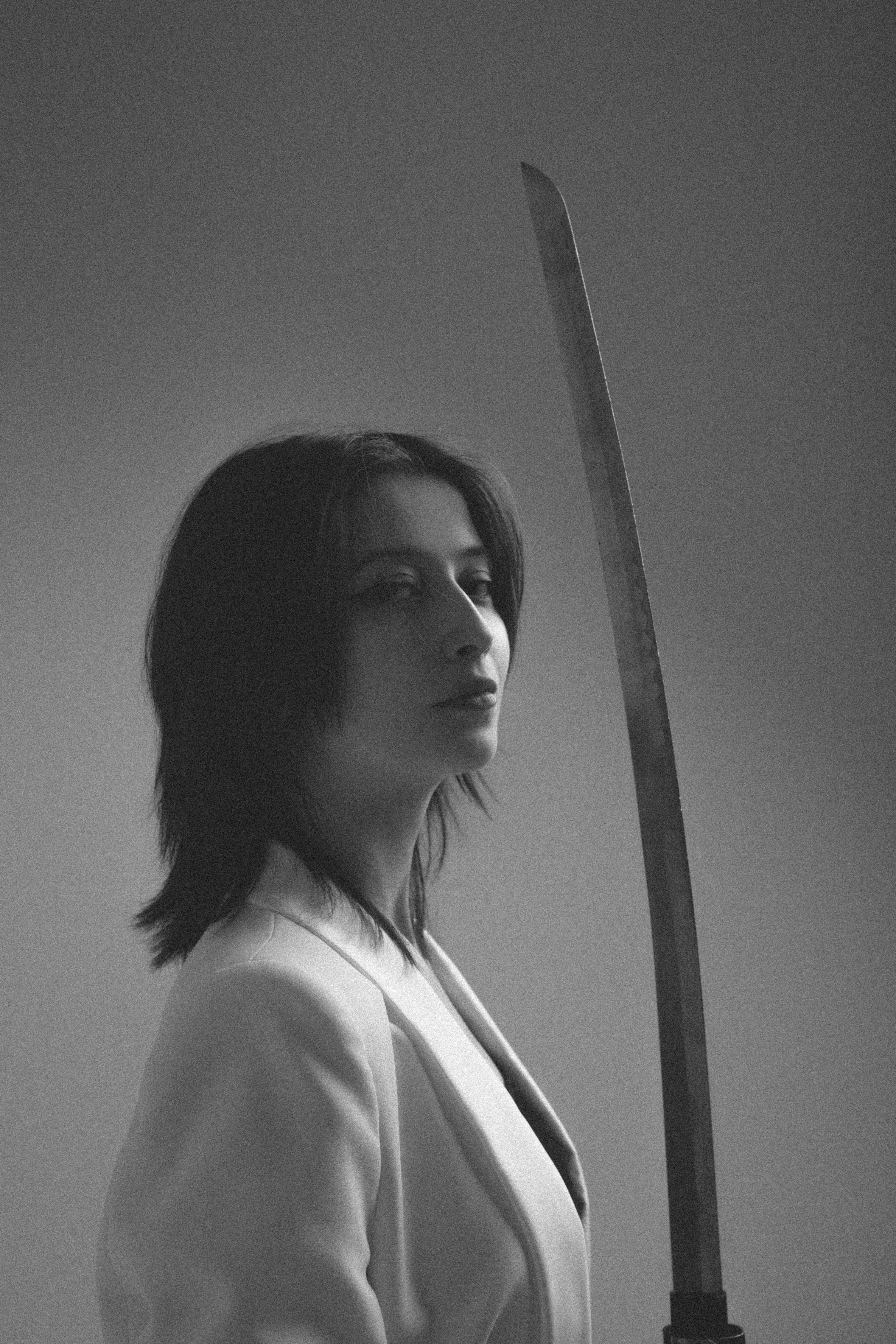 Monochrome Portrait of Woman with Katana Sword · Free Stock Photo