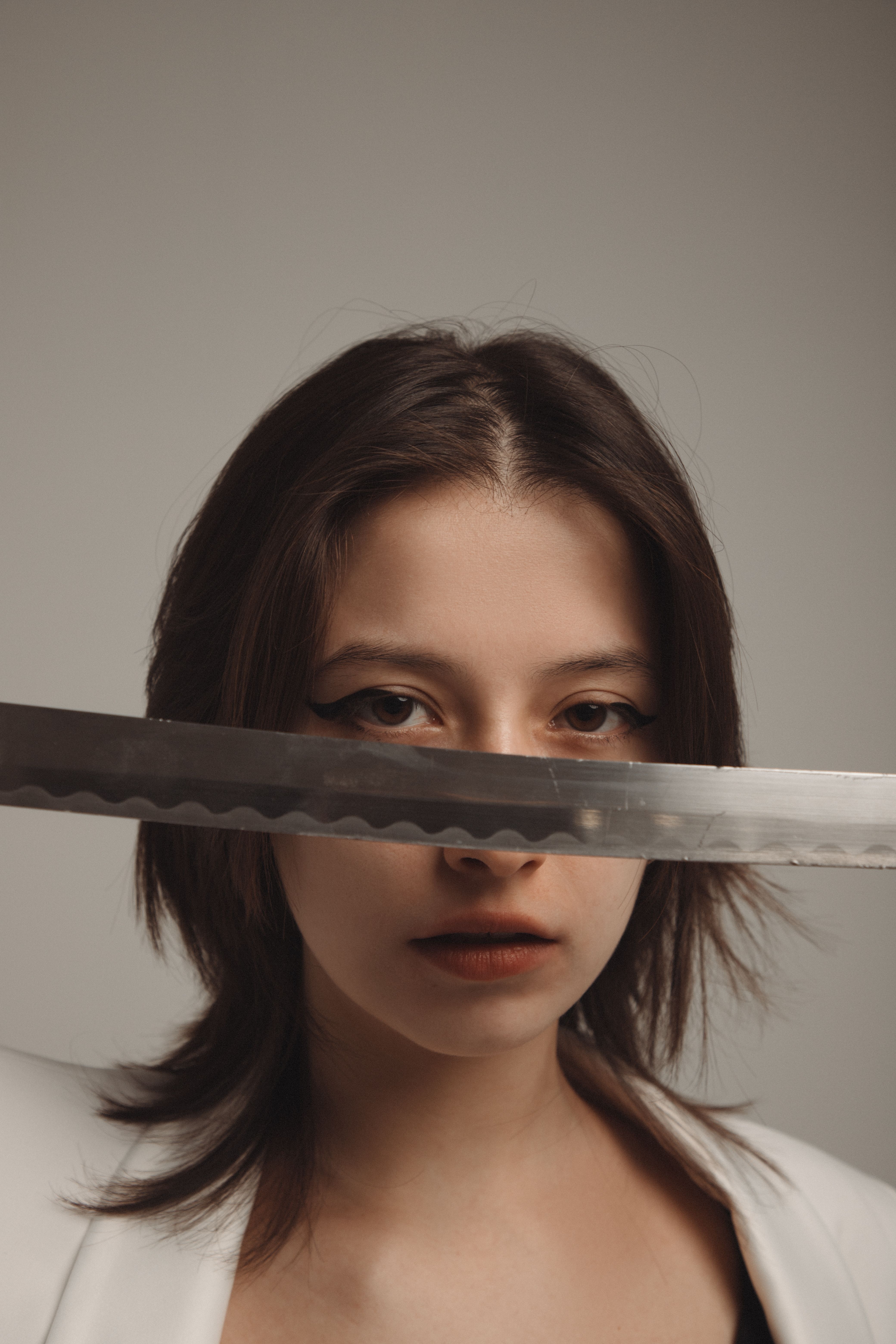 Portrait of Woman with Sword Creating Dramatic Mood · Free Stock Photo
