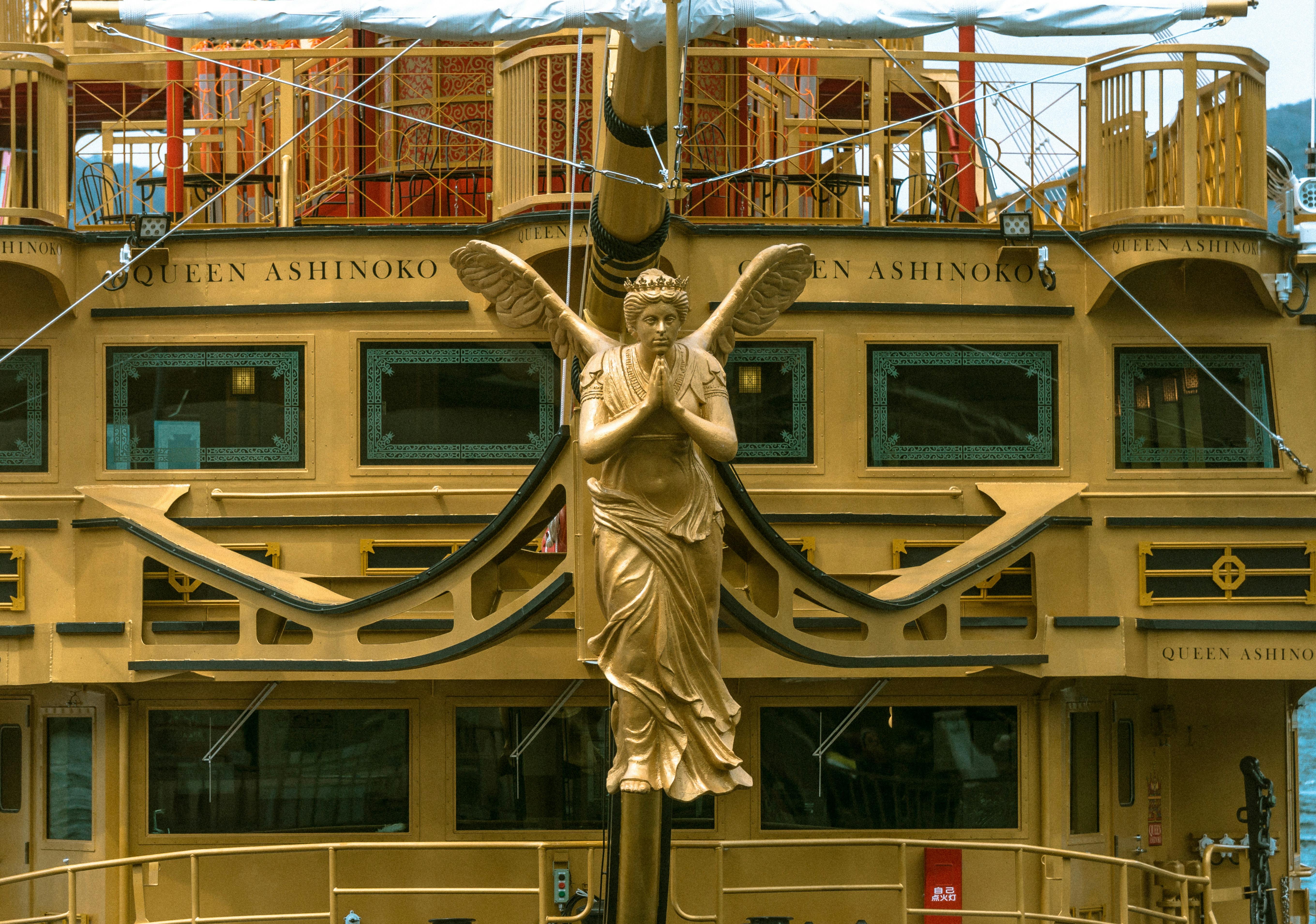 Golden Angel Figurehead on Ship in Lake Ashi · Free Stock Photo