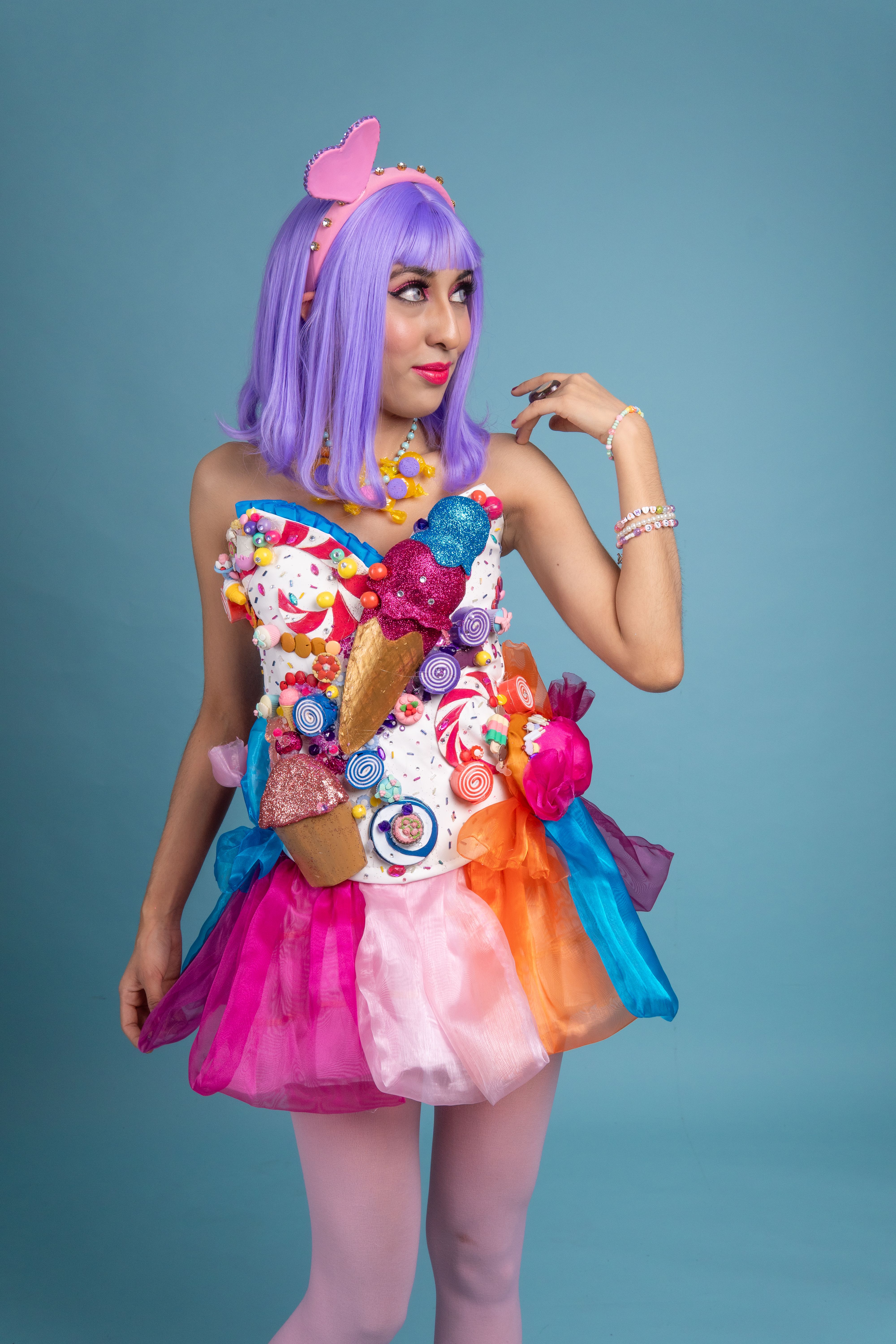 Whimsical Candy-Themed Cosplay with Purple Hair · Free Stock Photo