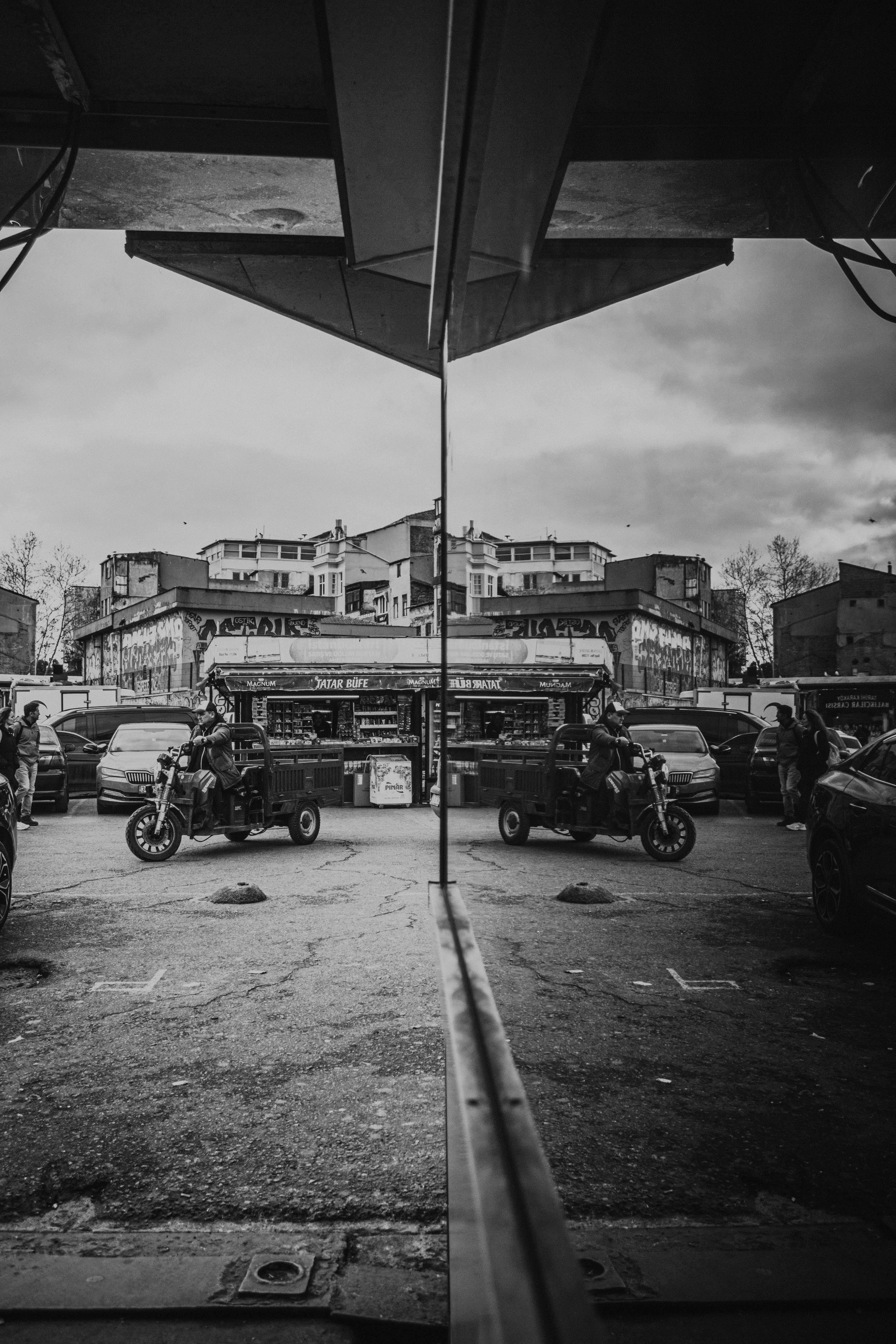 Urban Mirror Reflection with Motorcycles · Free Stock Photo