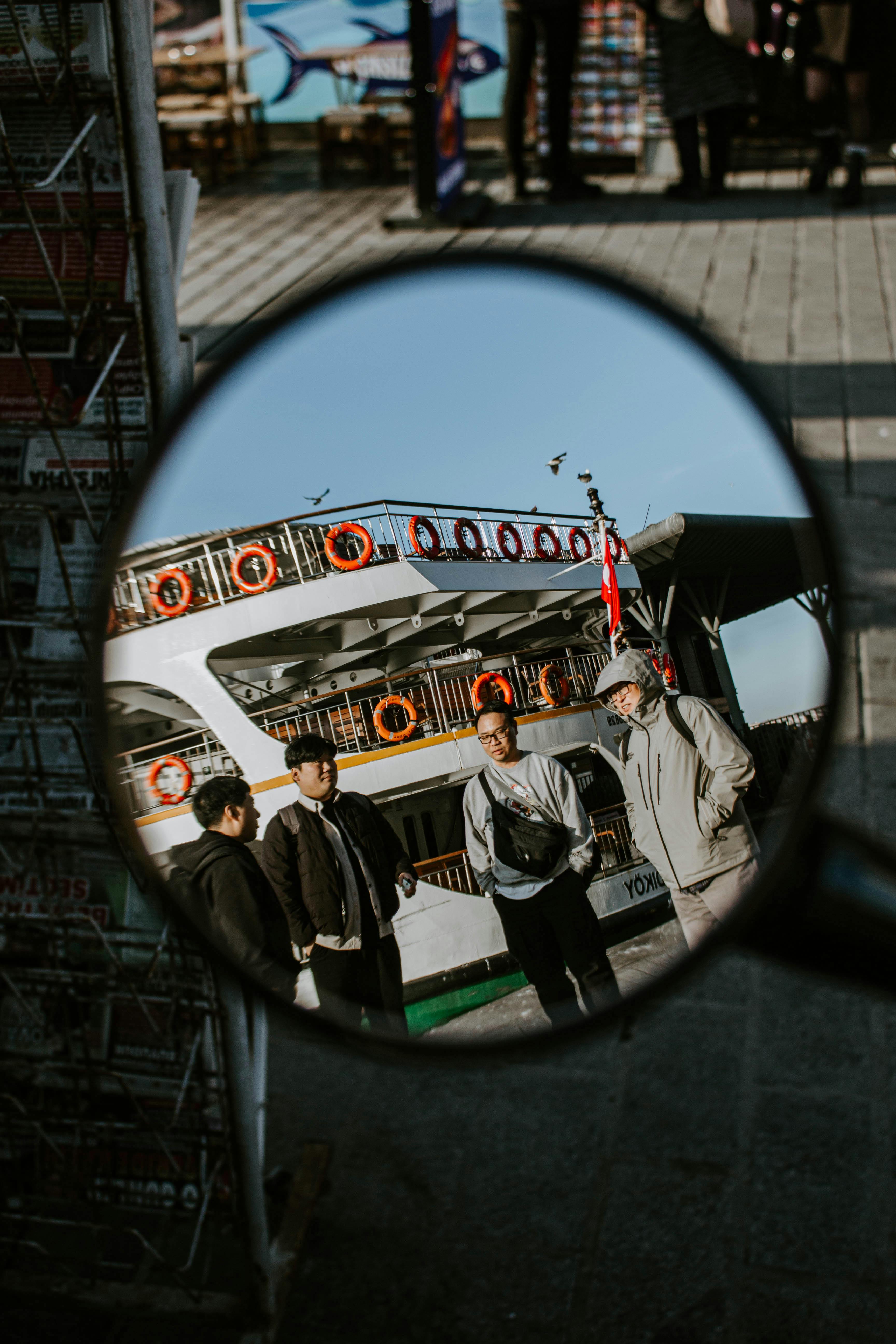 Creative Reflection of People by a Ferry · Free Stock Photo