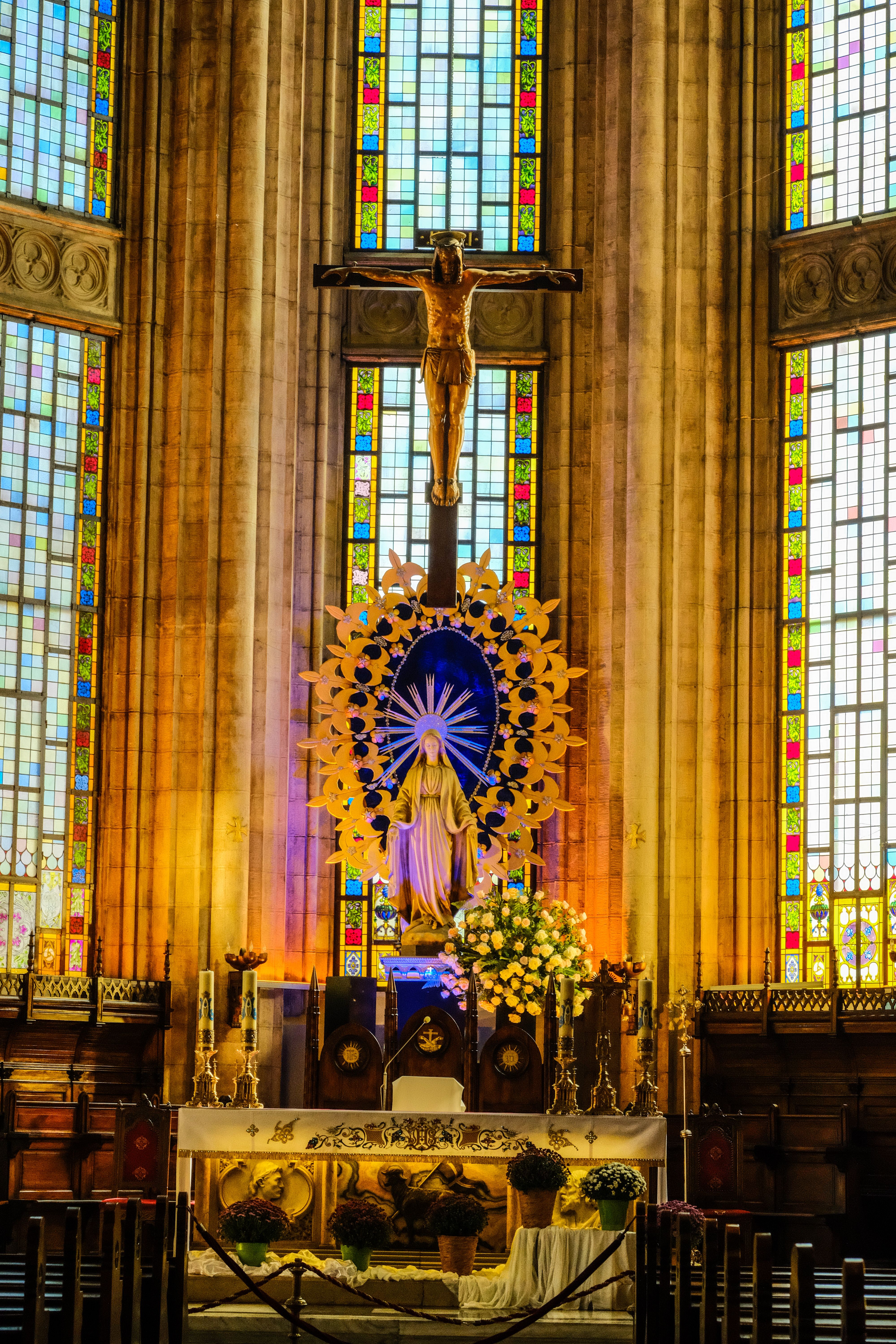 Ornate Church Altar with Stained Glass Windows · Free Stock Photo