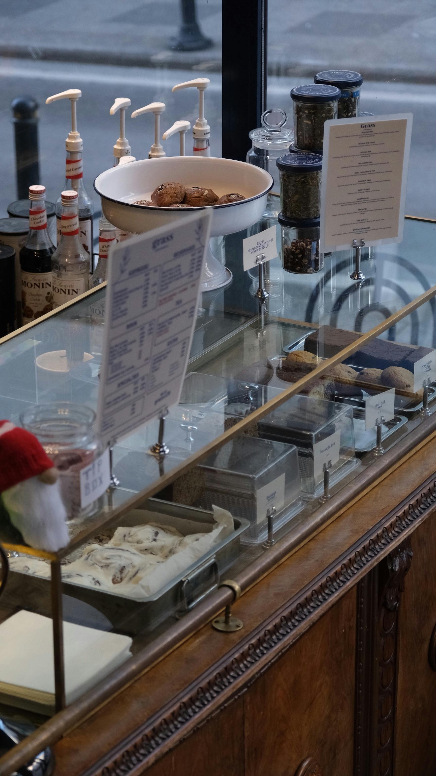 Elegant Ice Cream Parlor Display with Toppings · Free Stock Photo