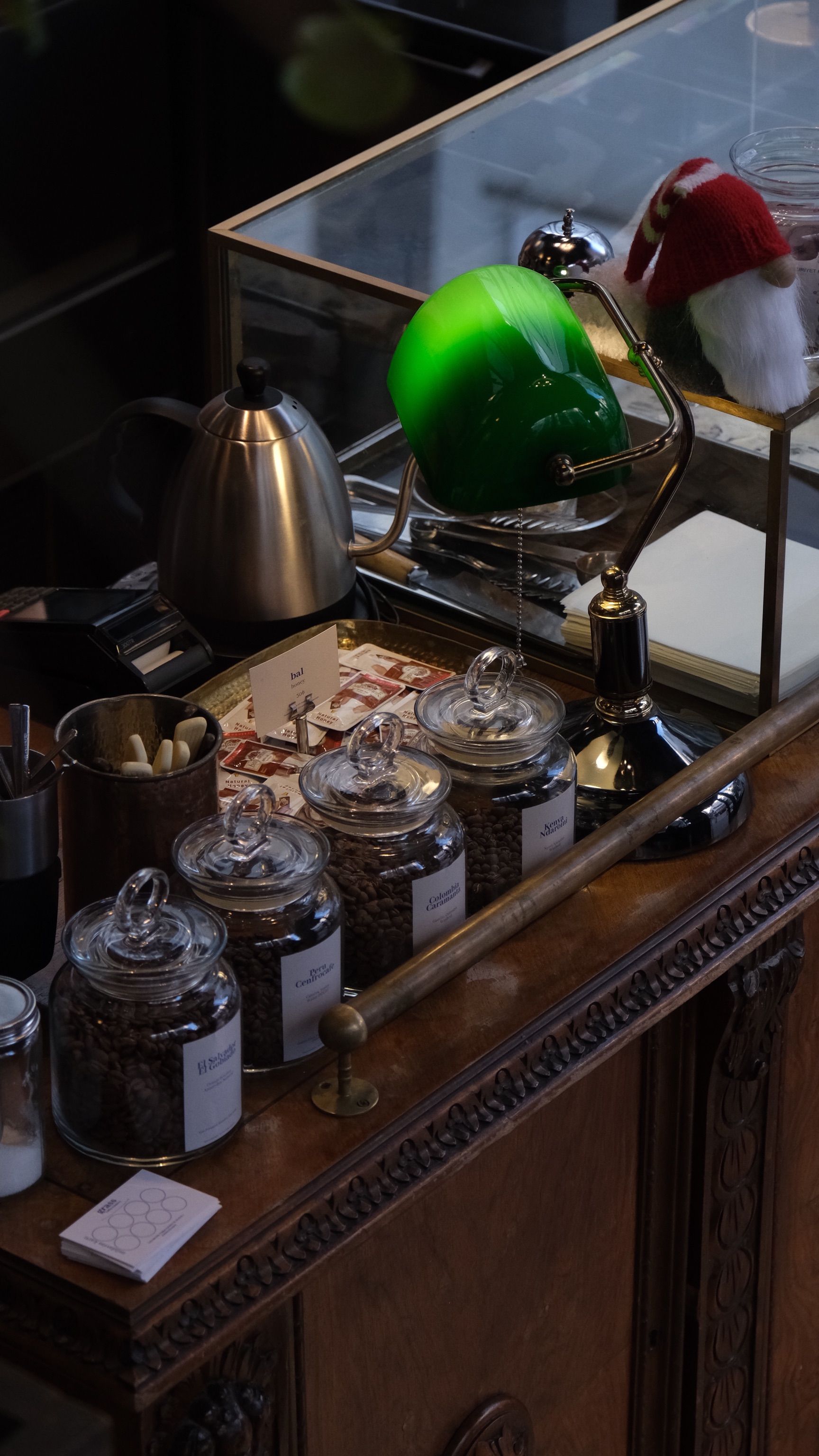 Vintage Coffee Shop Counter with Tea Jars · Free Stock Photo