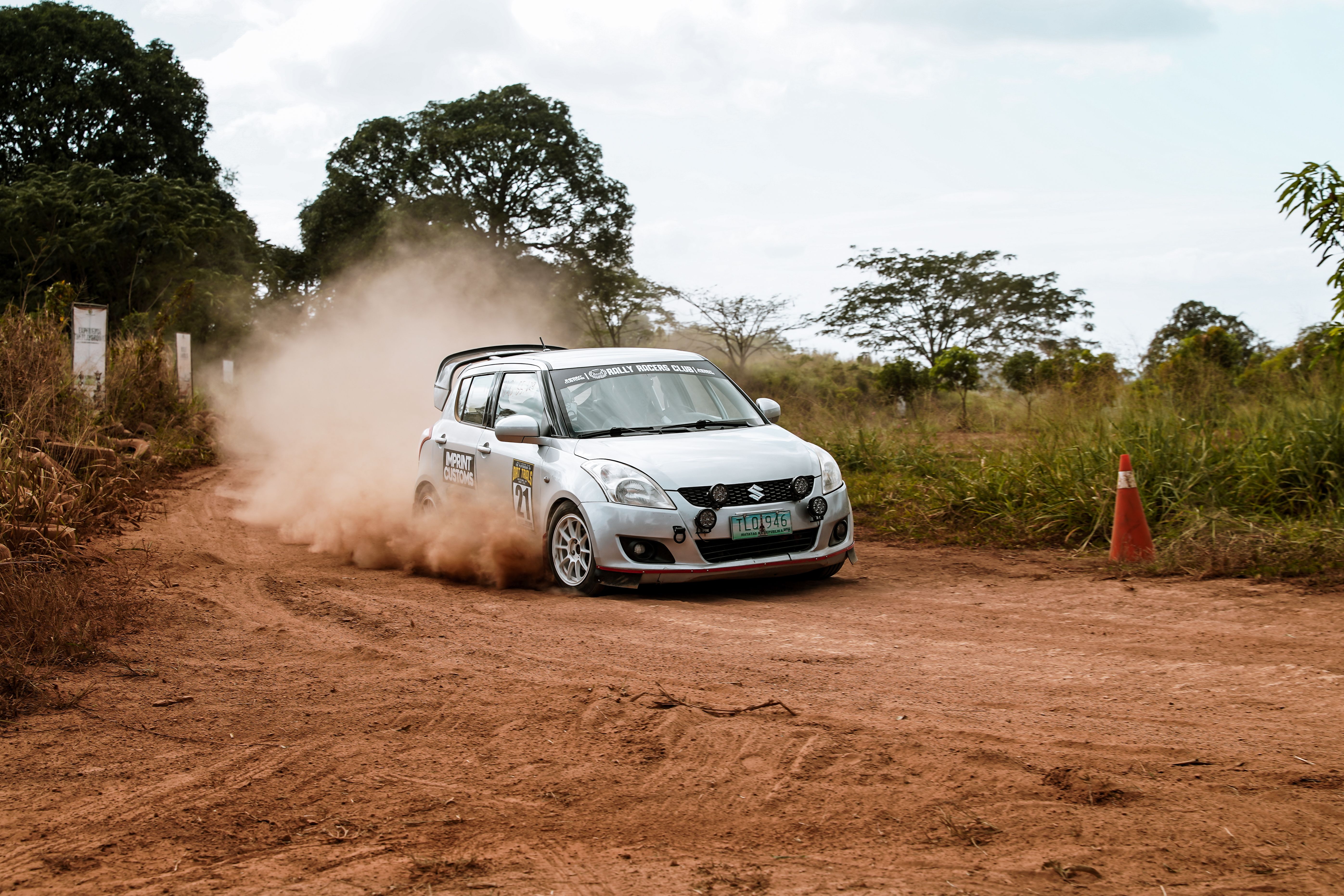 Dynamic Off-Road Rally Car Racing Action Shot · Free Stock Photo