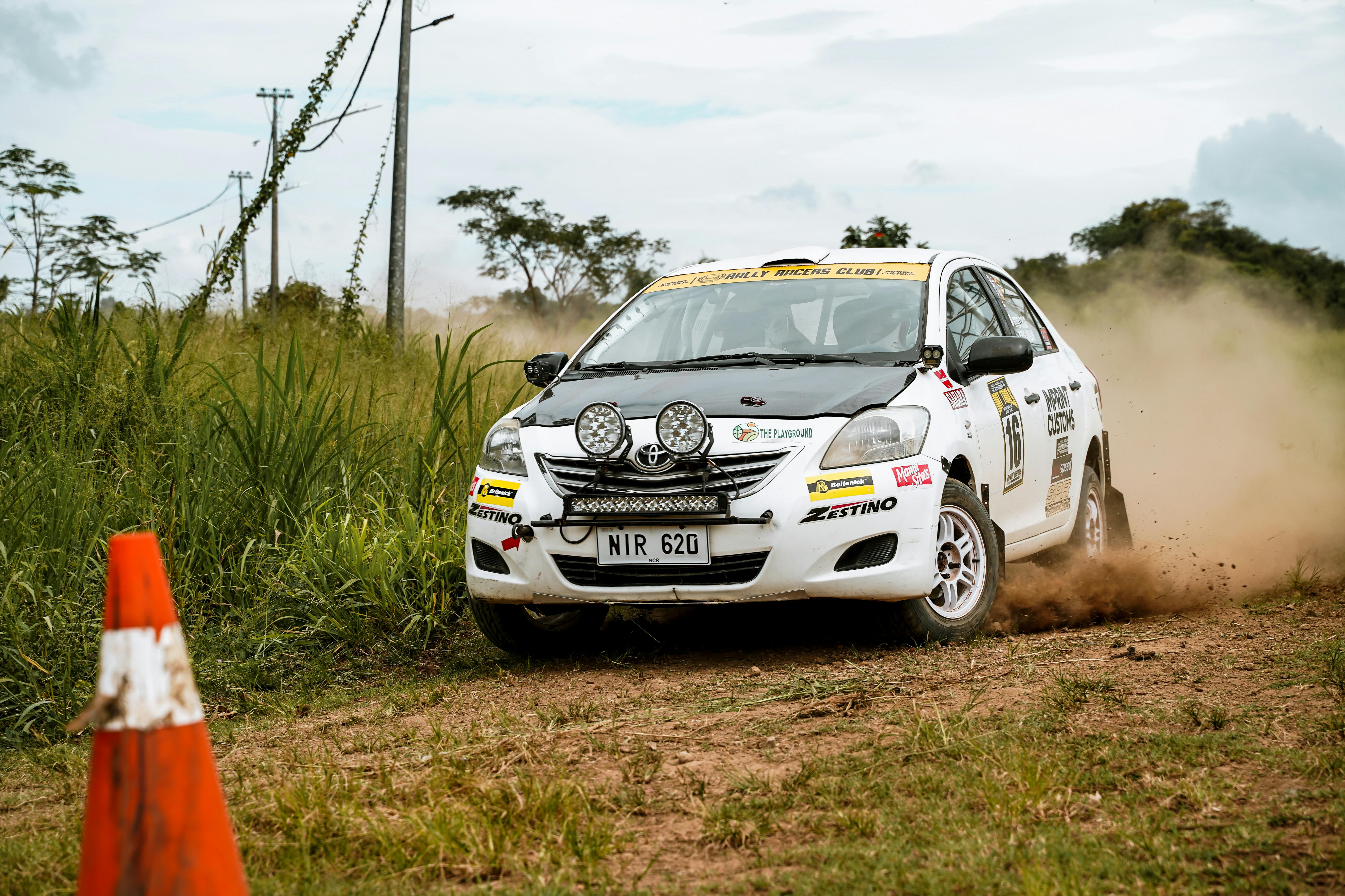 Dynamic Off-road Rally Car Racing in Action · Free Stock Photo