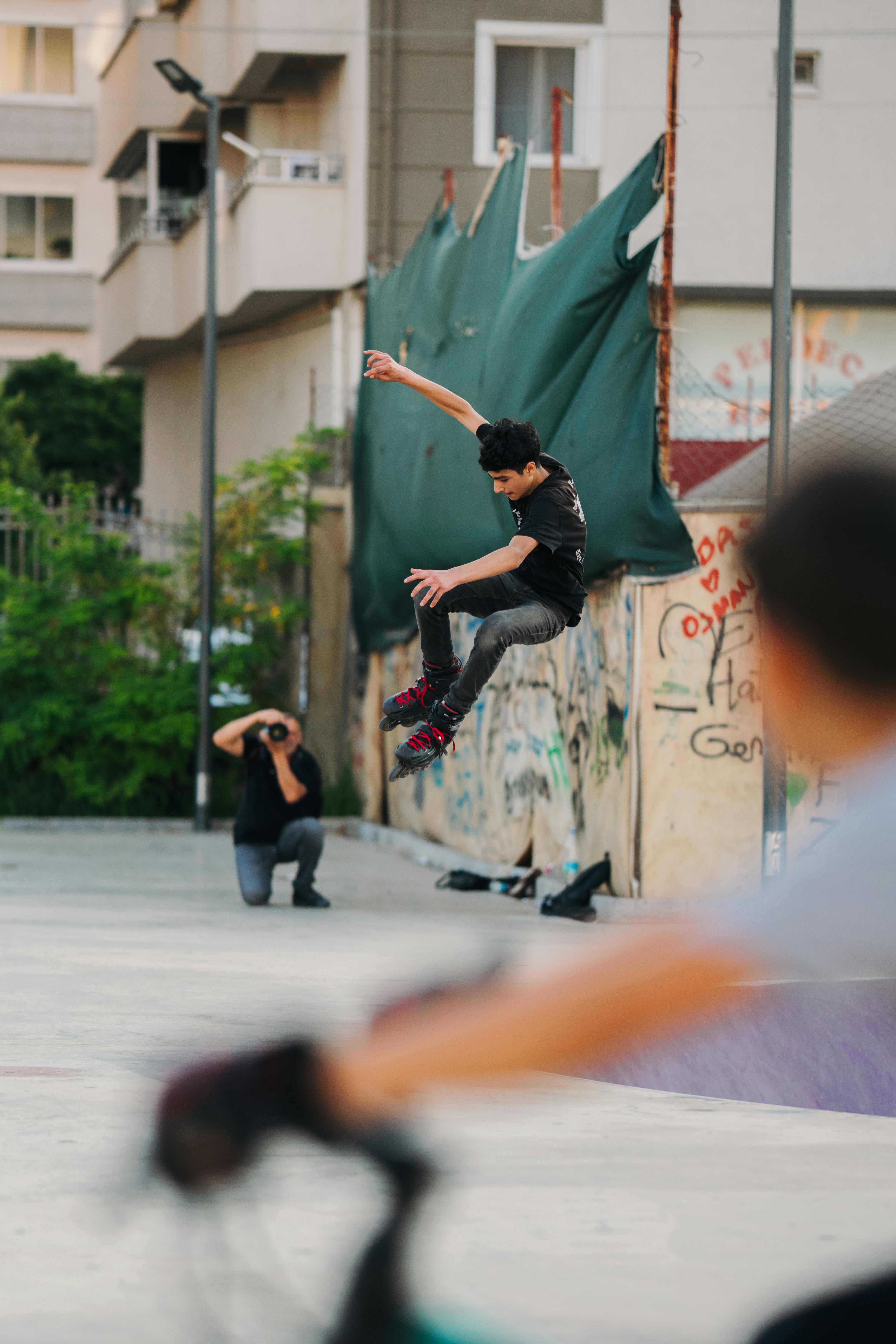 Urban Rollerblading Trick Captured Mid-Air · Free Stock Photo