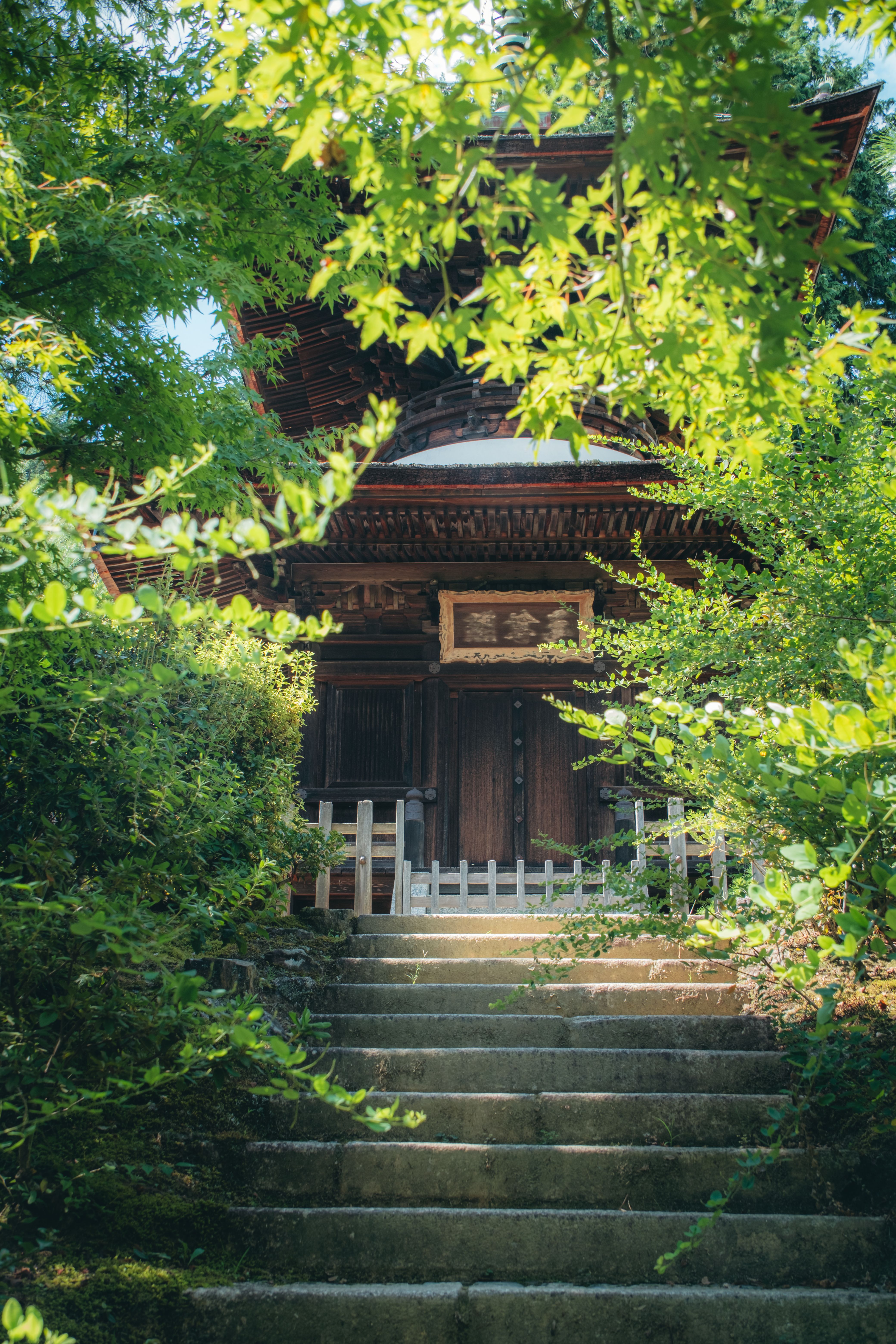 Serene Japanese Temple Amidst Greenery · Free Stock Photo