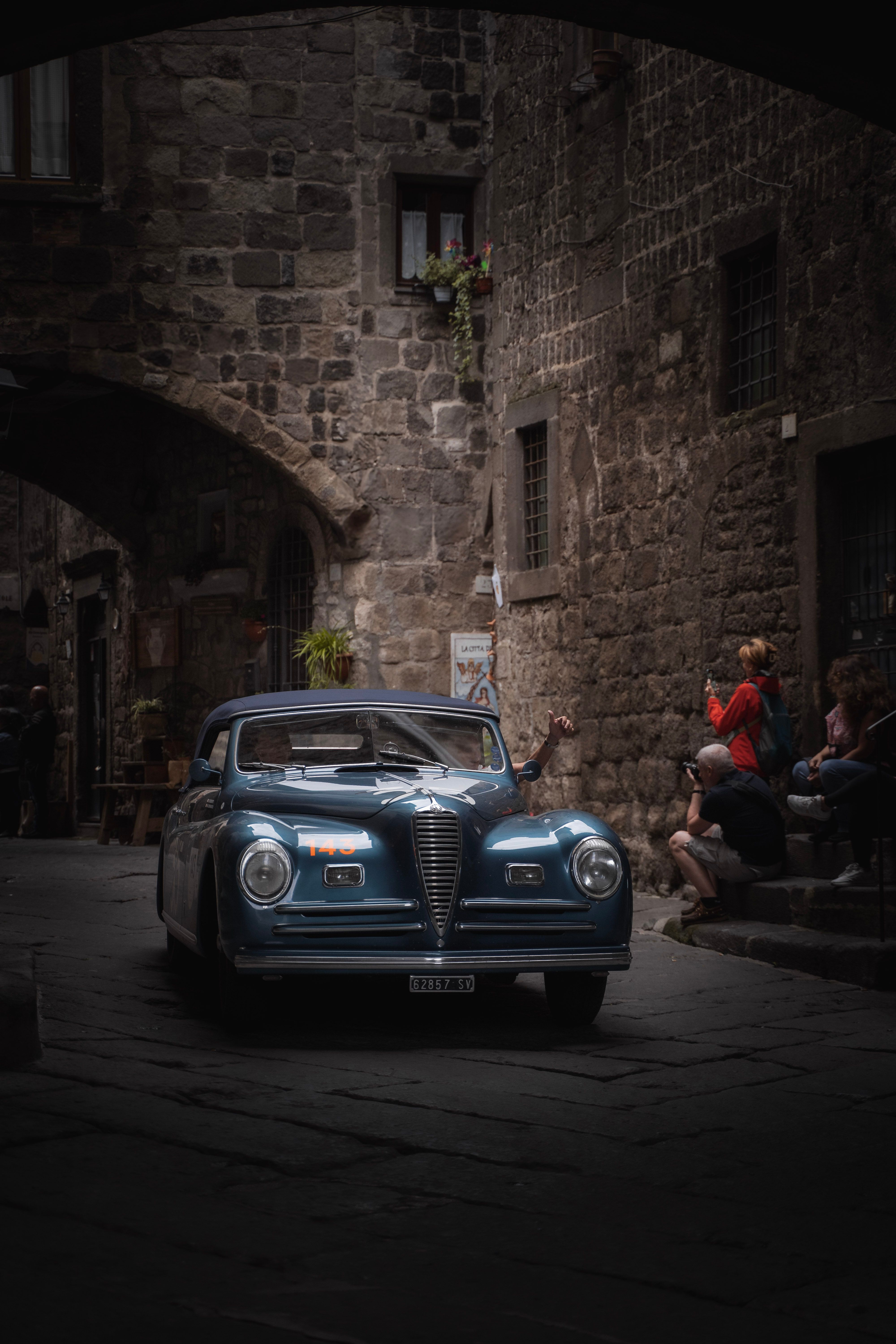 Classic Blue Car in Historic Stone Alley · Free Stock Photo