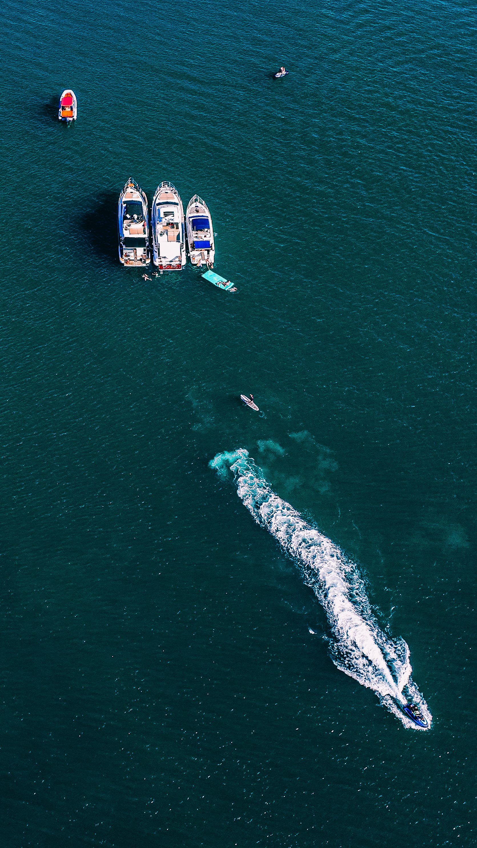 Aerial View of Boats and Jet Ski on Open Water · Free Stock Photo