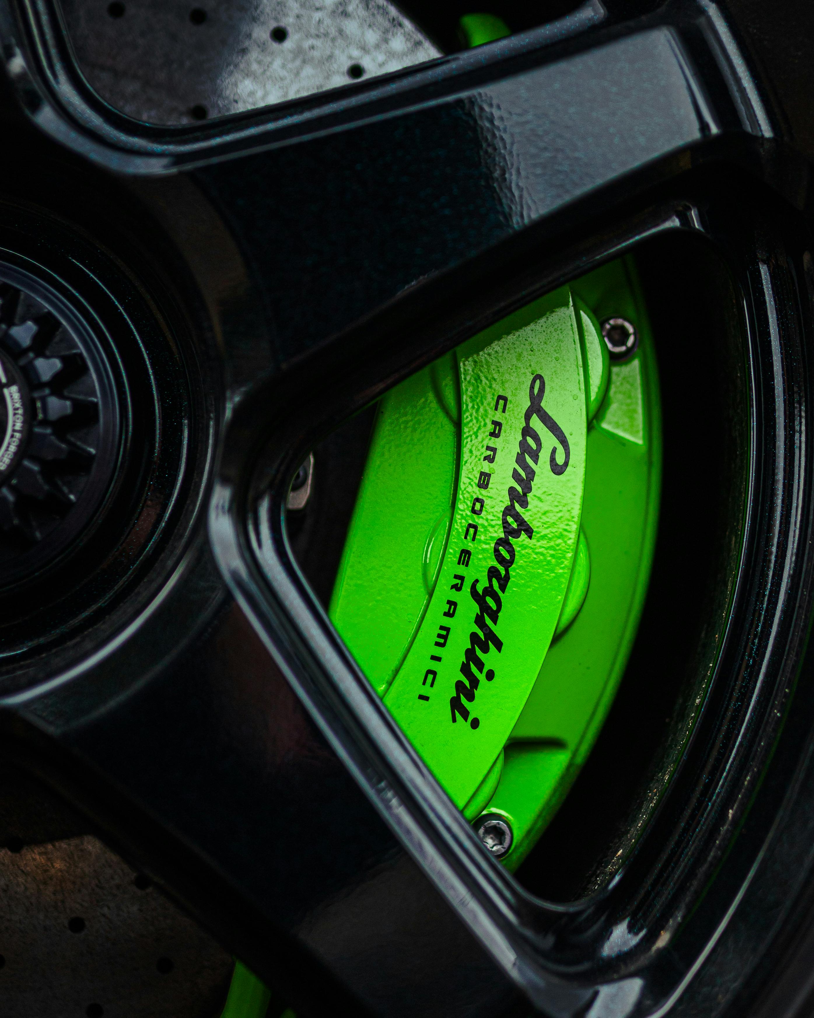 Close-up of Lamborghini Brake Caliper in Green · Free Stock Photo