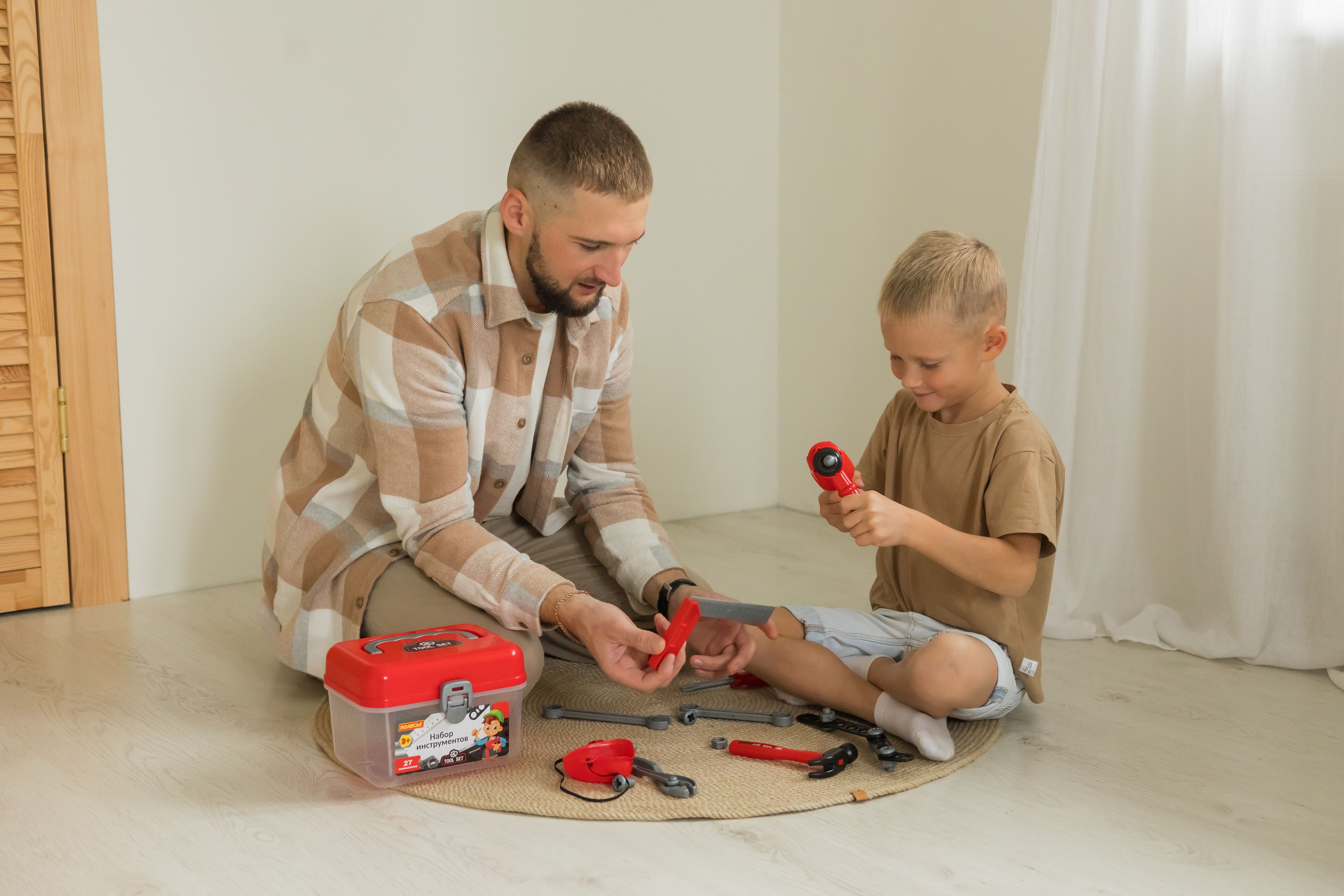 Father and Son Bonding Over Building Toys · Free Stock Photo
