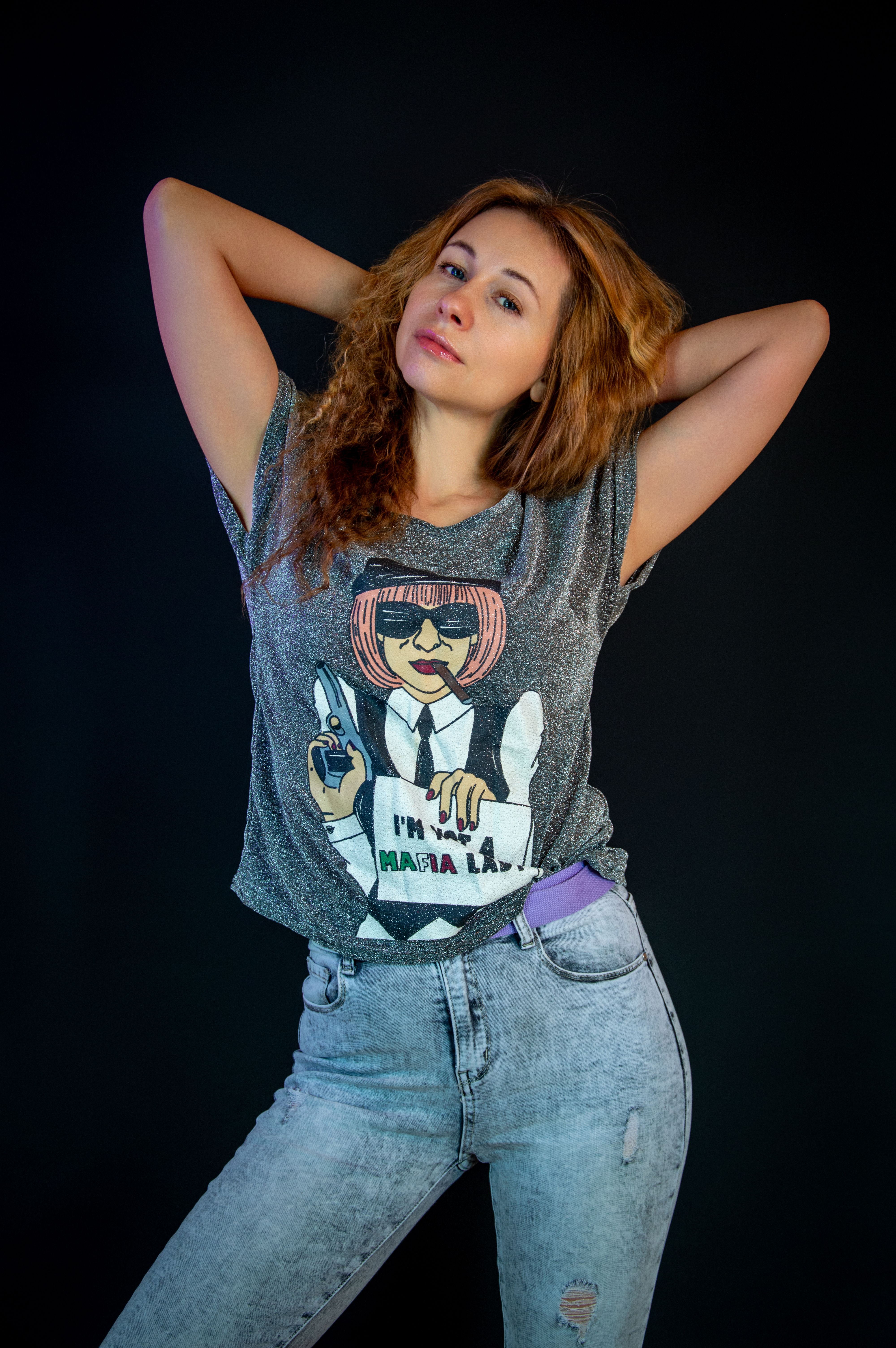 Fashionable Woman Posing in Graphic T-shirt · Free Stock Photo