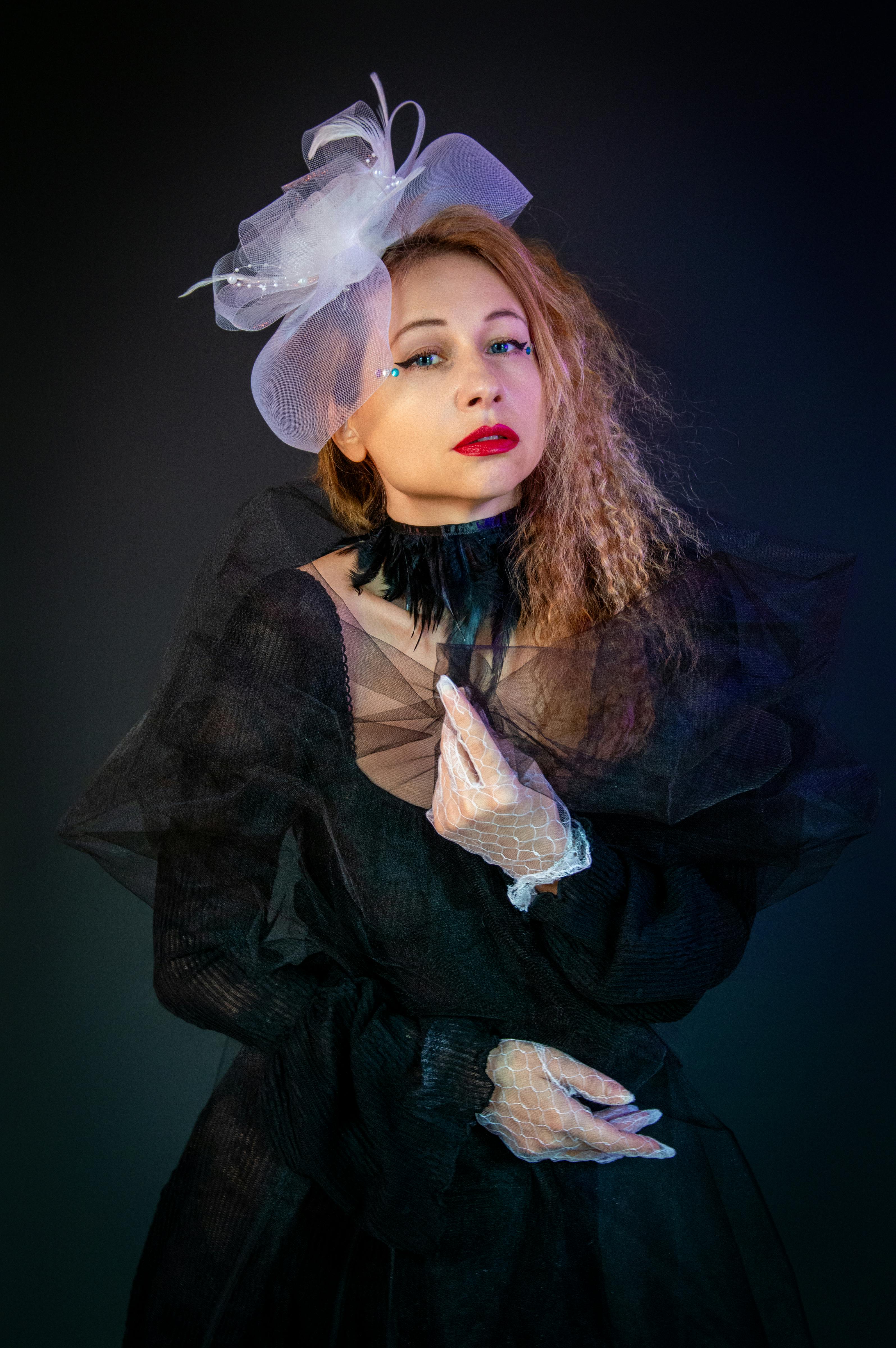 Elegant Woman in Gothic Fashion Portrait · Free Stock Photo