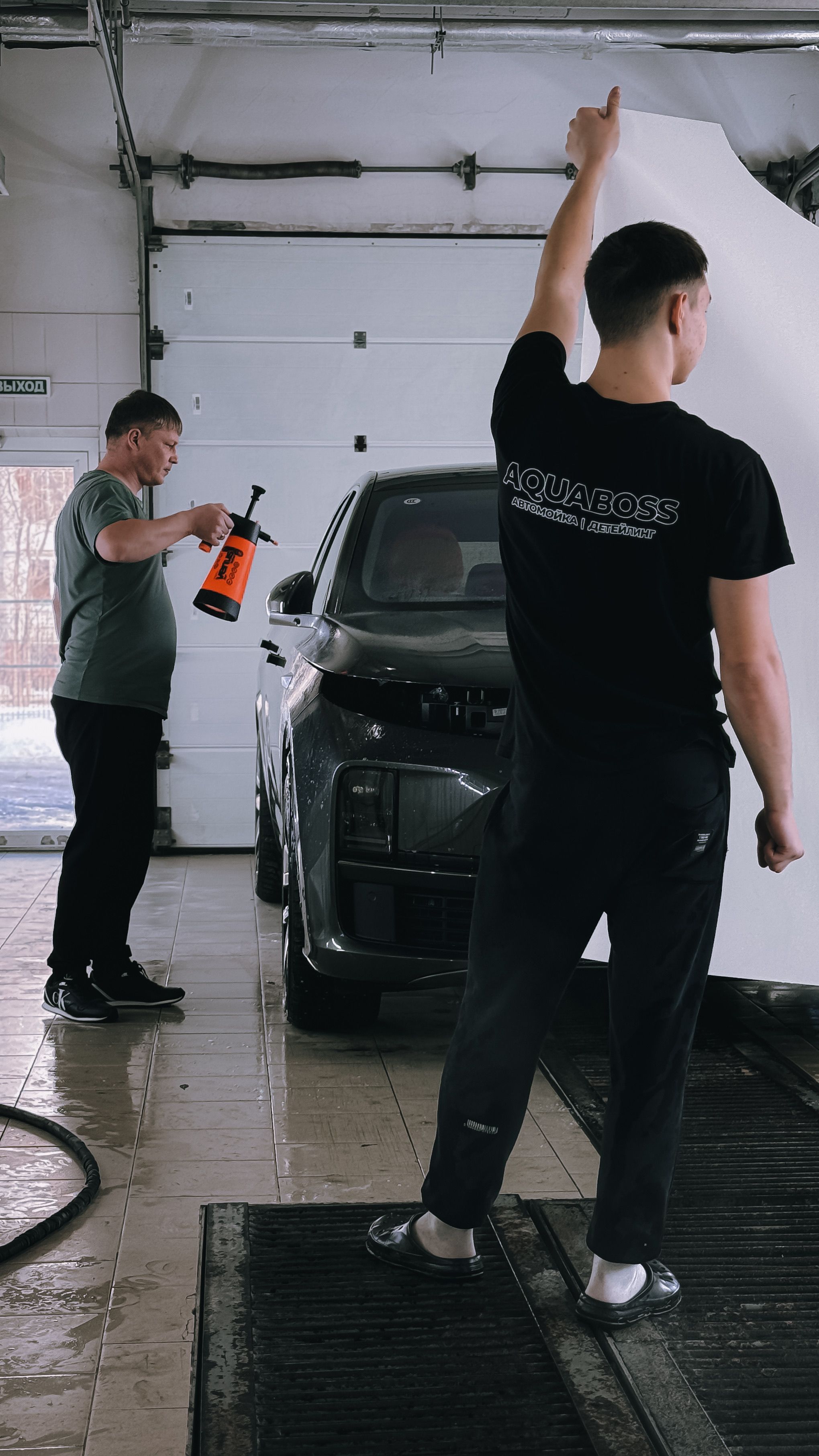 Professional Car Detailing Indoor Garage Scene · Free Stock Photo