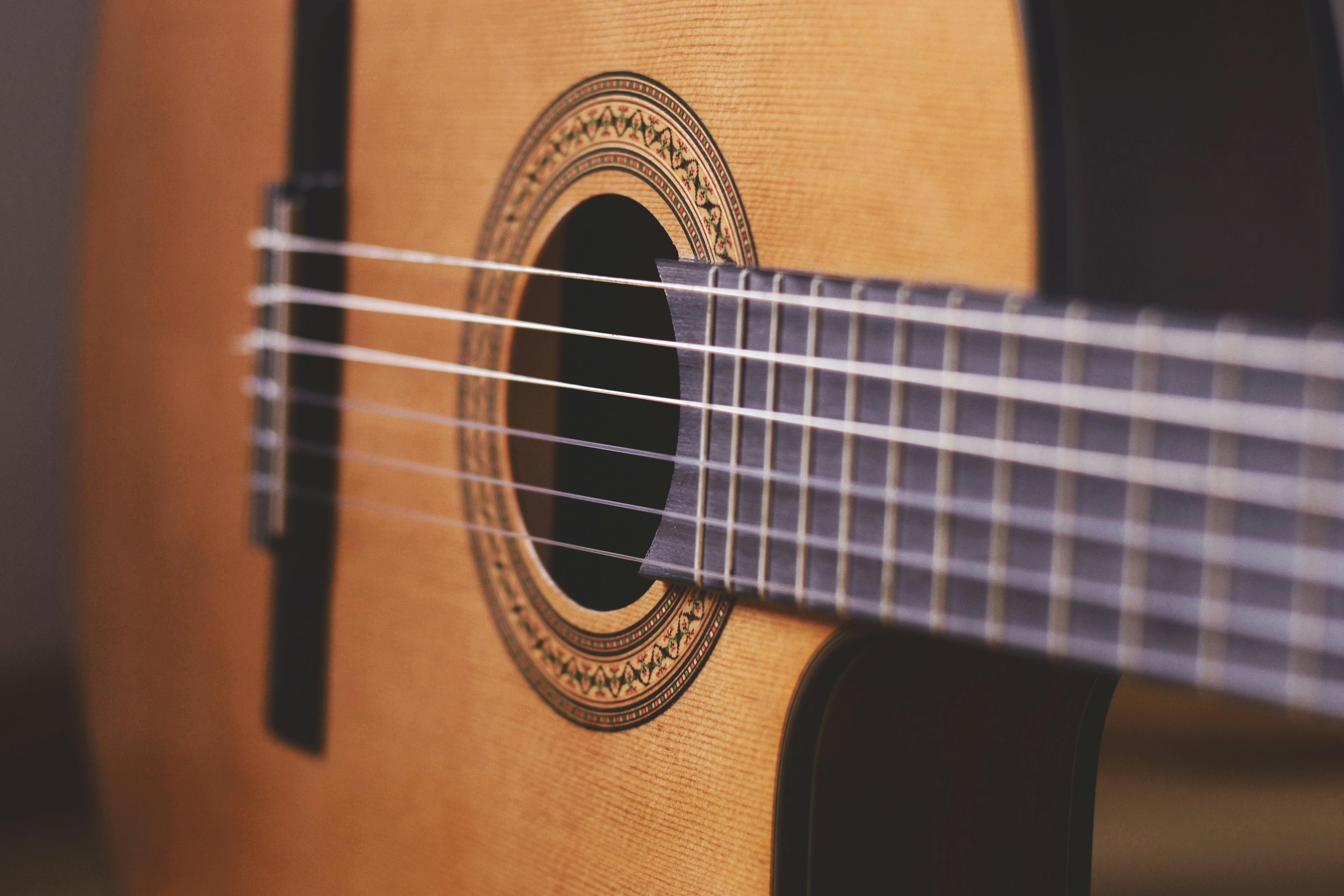 Close-Up of Classical Acoustic Guitar Strings · Free Stock Photo