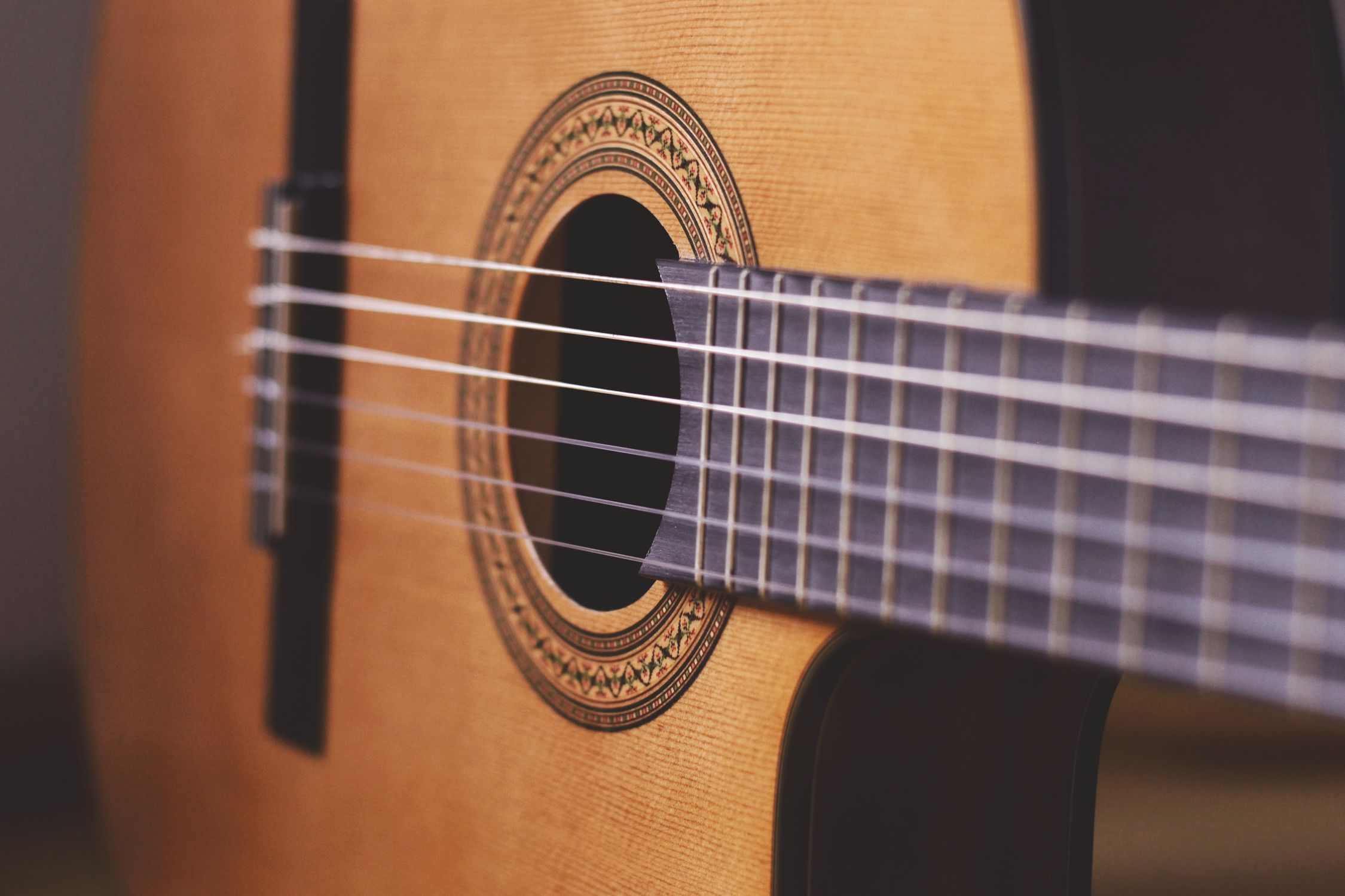 Close-Up of Classical Acoustic Guitar Strings · Free Stock Photo