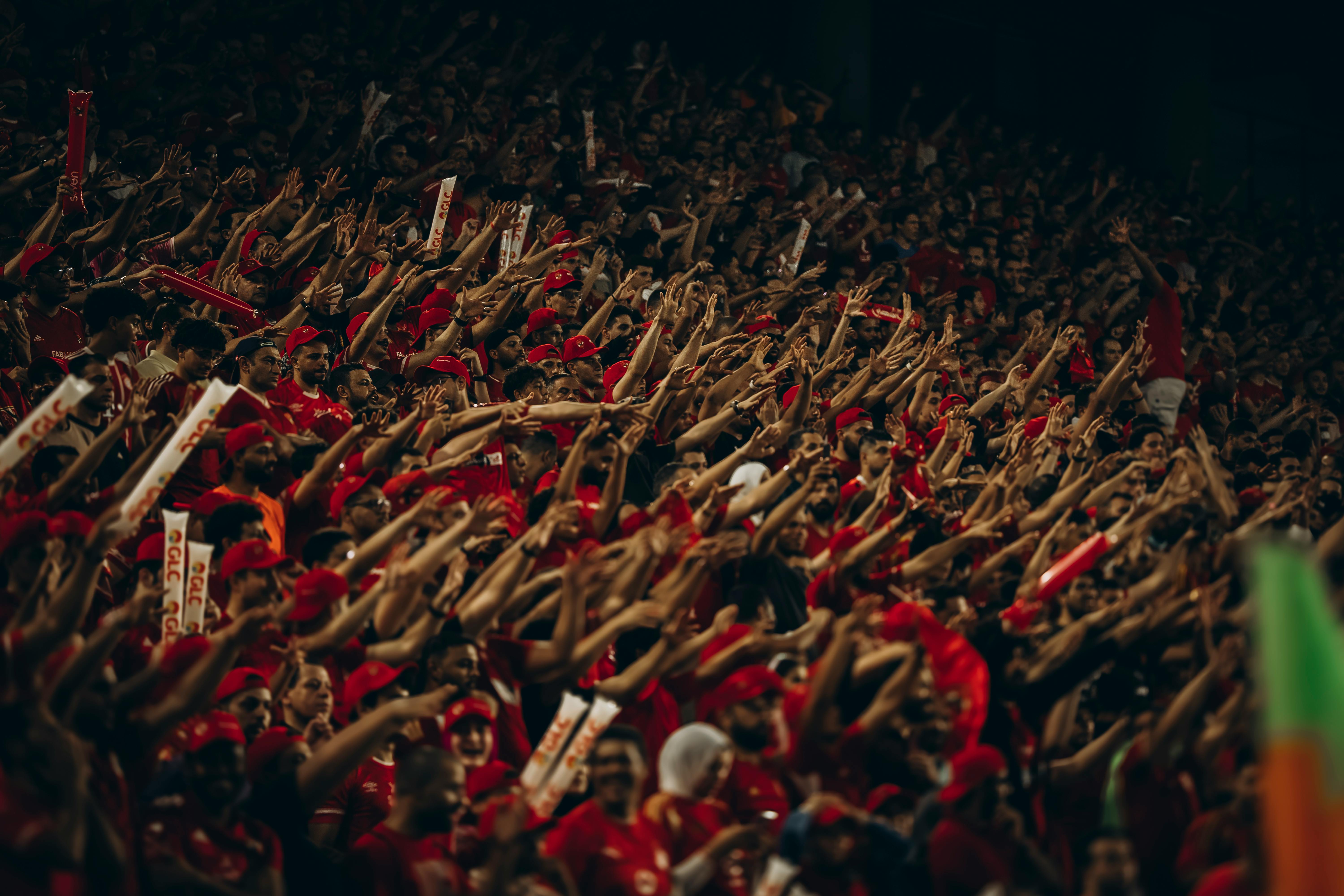 Passionate Football Fans at a Live Match · Free Stock Photo