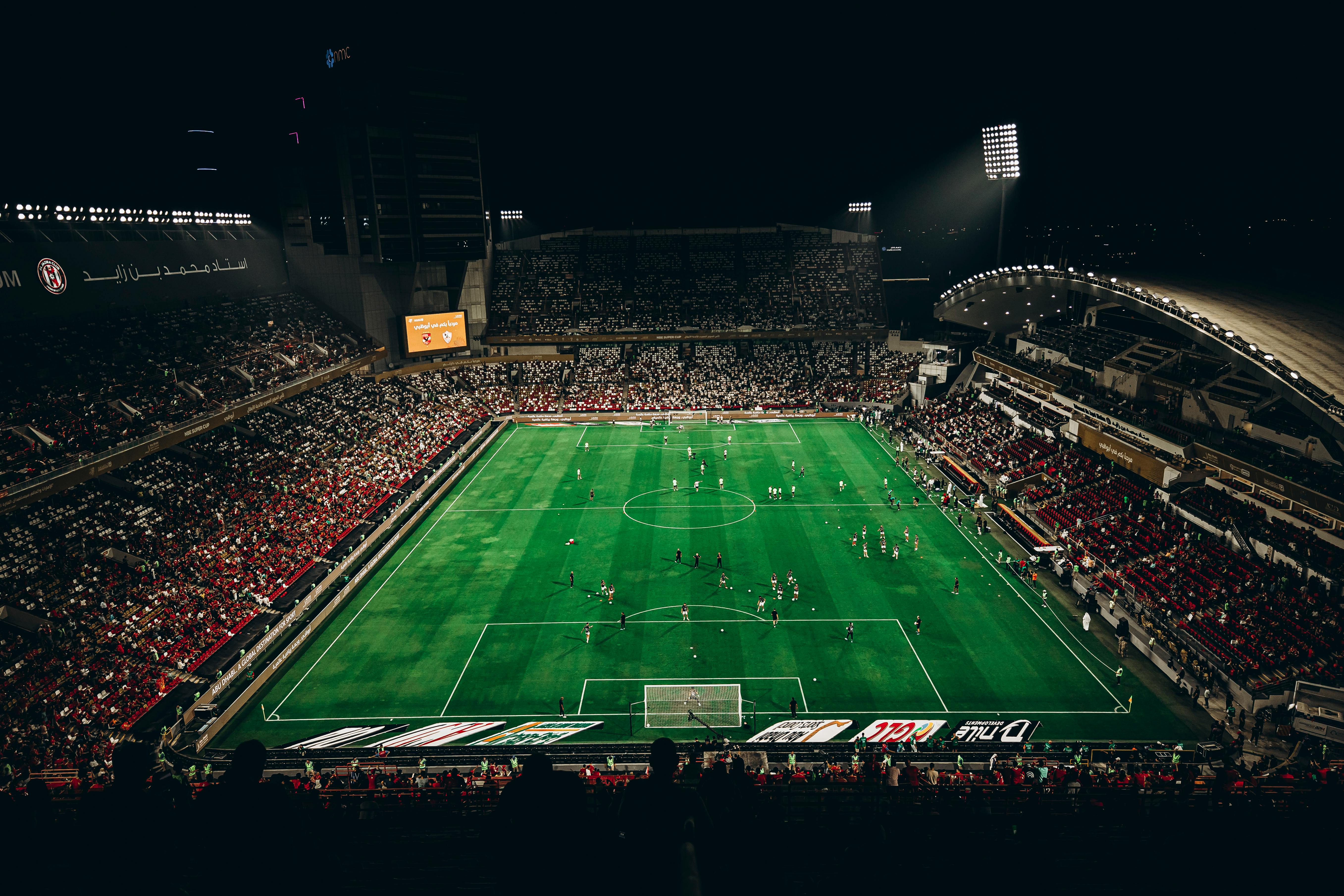Aerial View of a Night Football Match in Stadium · Free Stock Photo