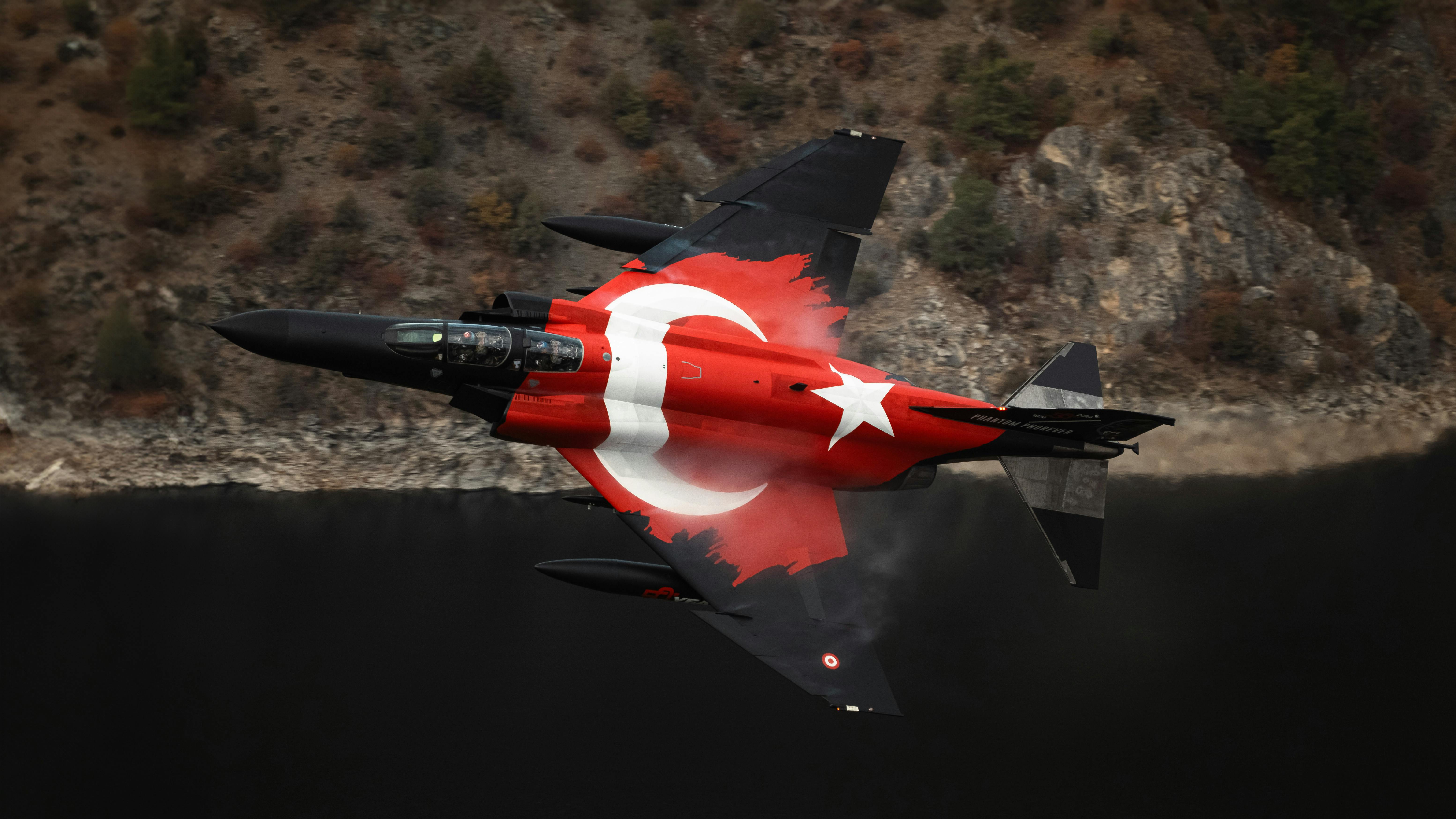 Turkish Air Force Jet Performing Aerial Maneuver · Free Stock Photo