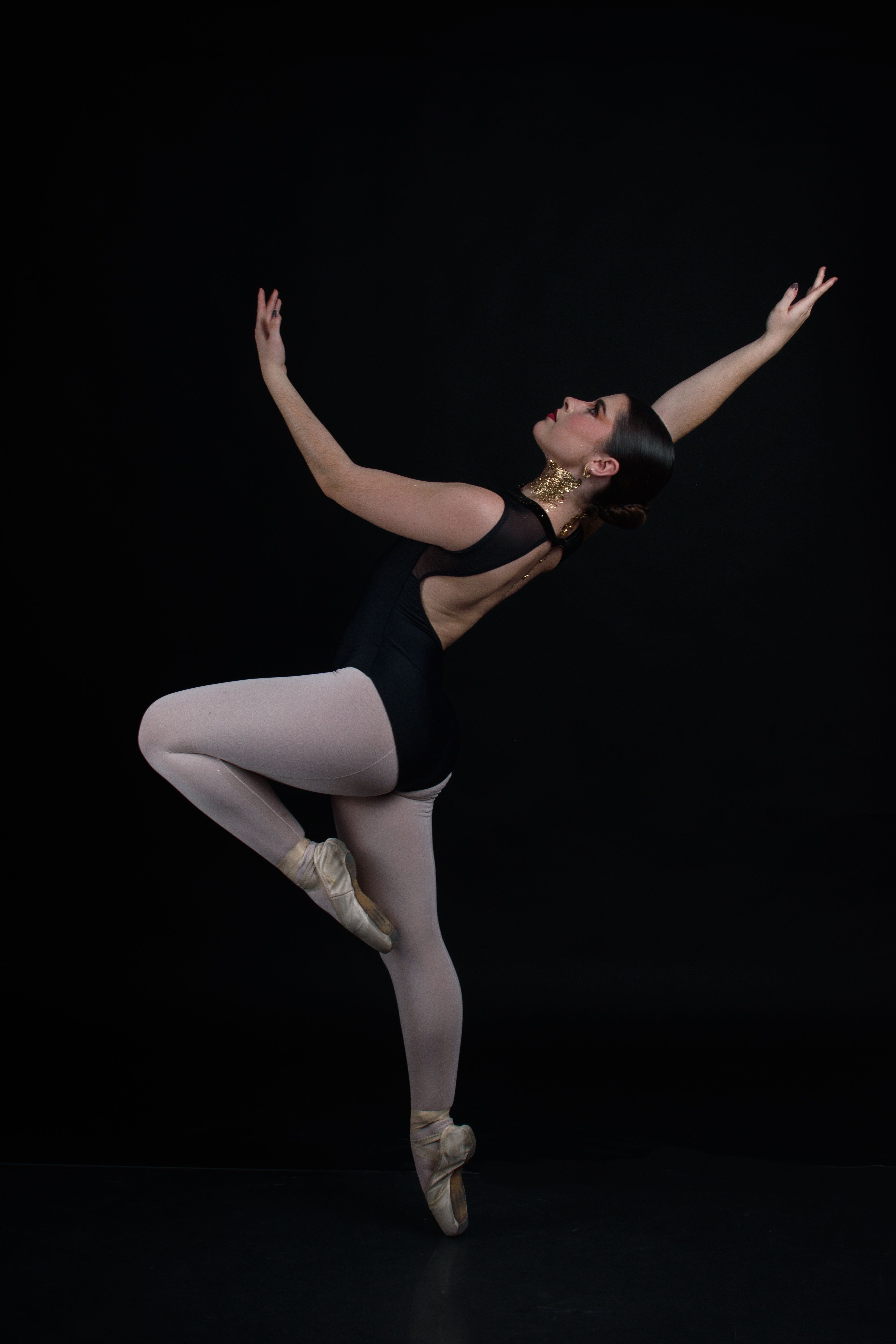 Elegant Ballet Dancer in Dramatic Pose · Free Stock Photo