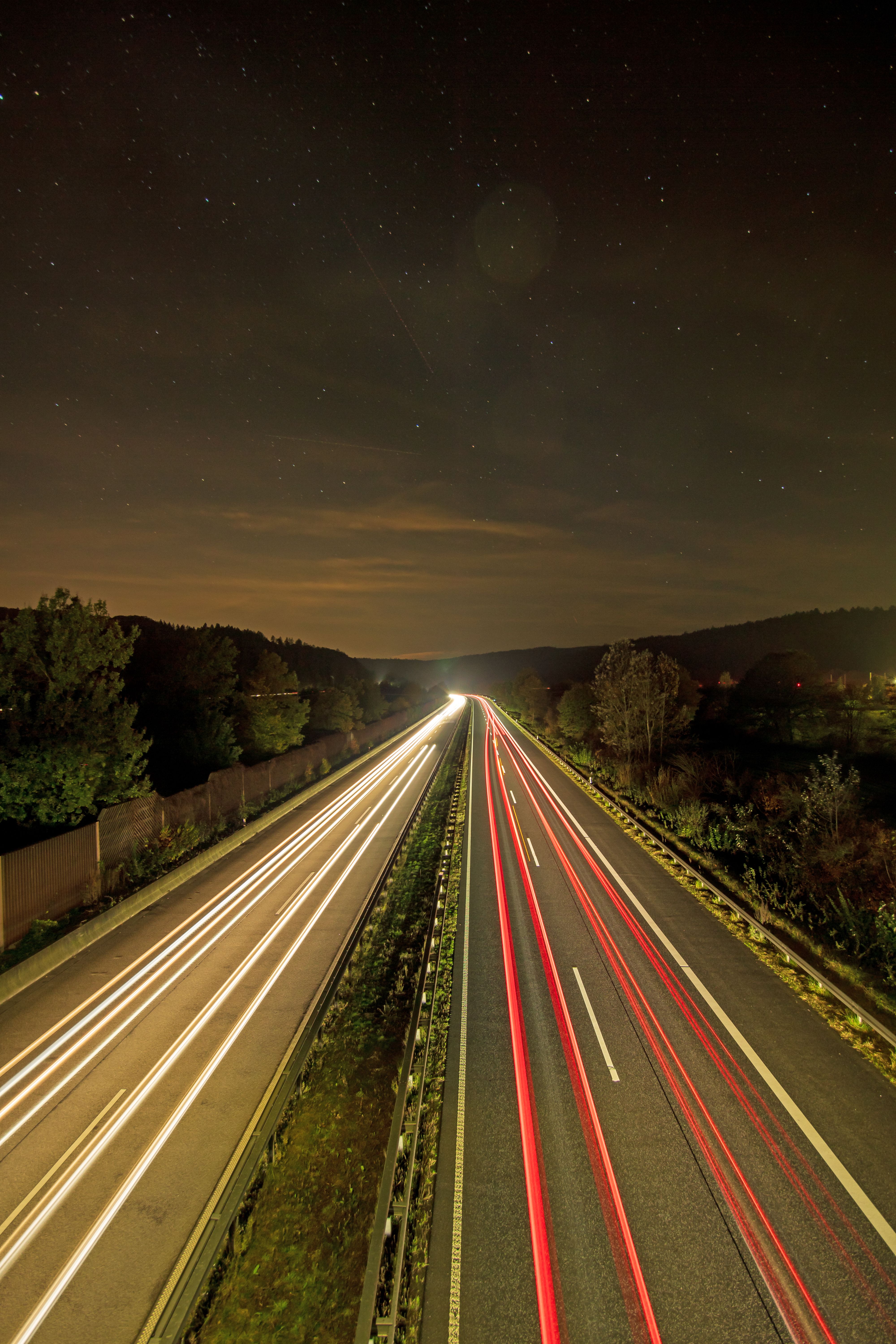 Dynamic Night Highway with Starry Sky · Free Stock Photo