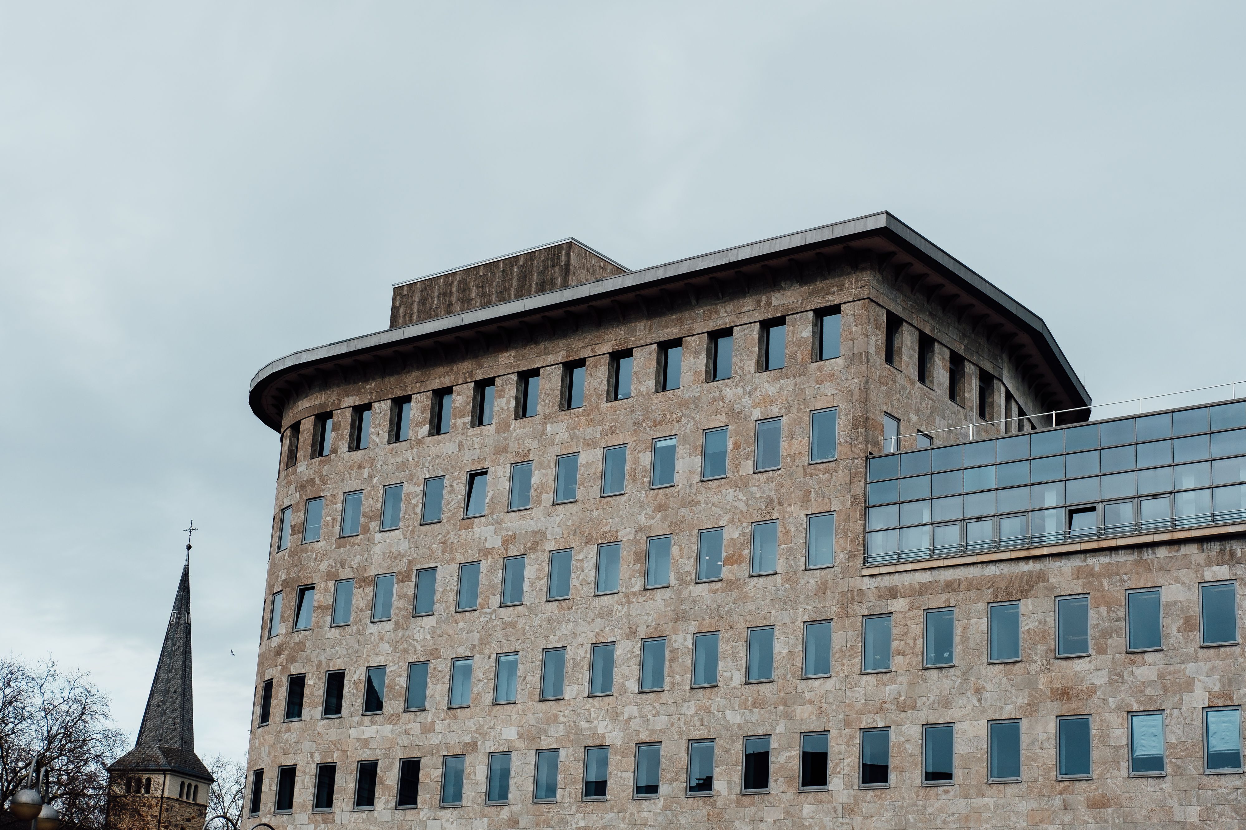 Modern Urban Architecture with Church Spire · Free Stock Photo