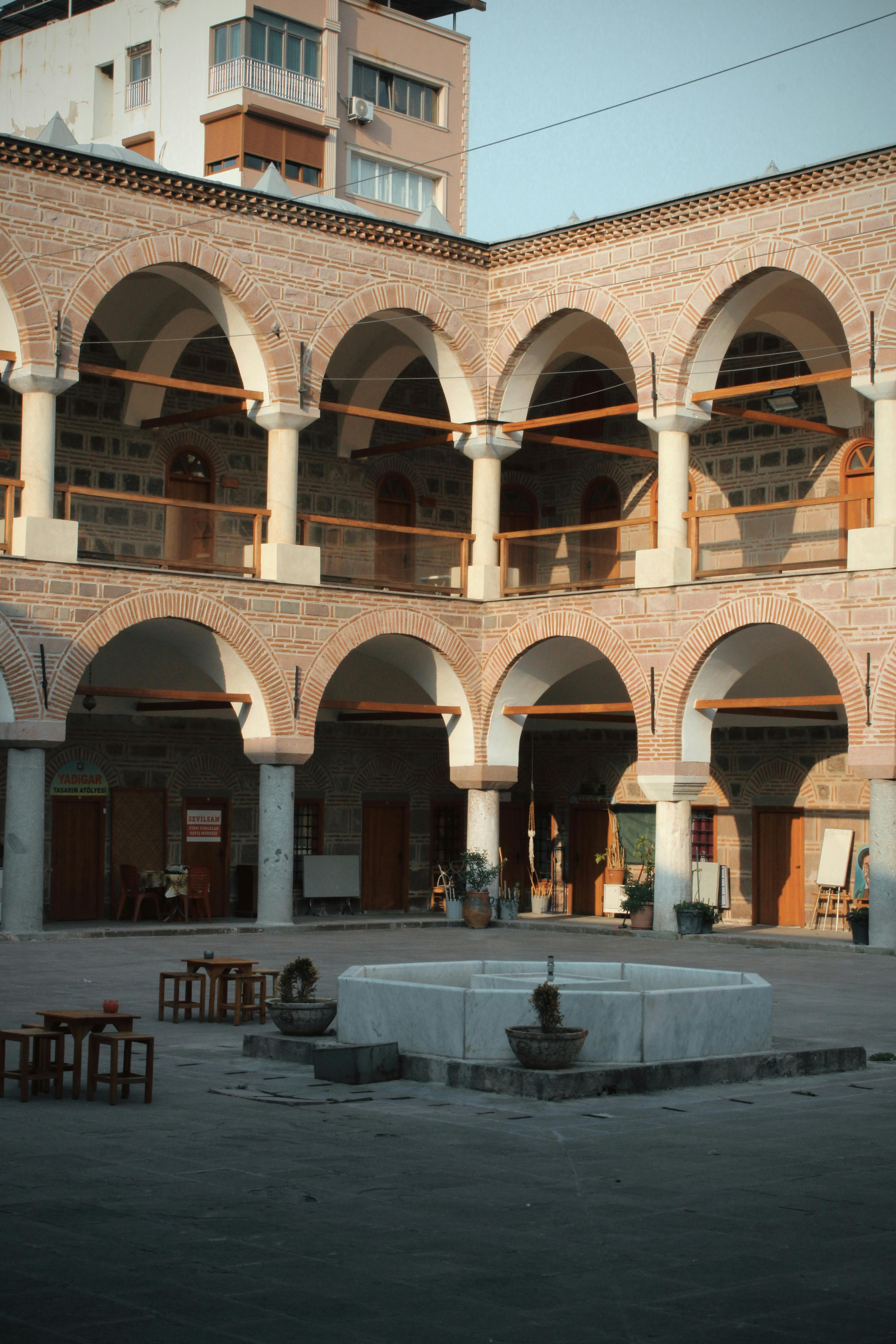 Historical Ottoman Architectural Courtyard with Arches · Free Stock Photo