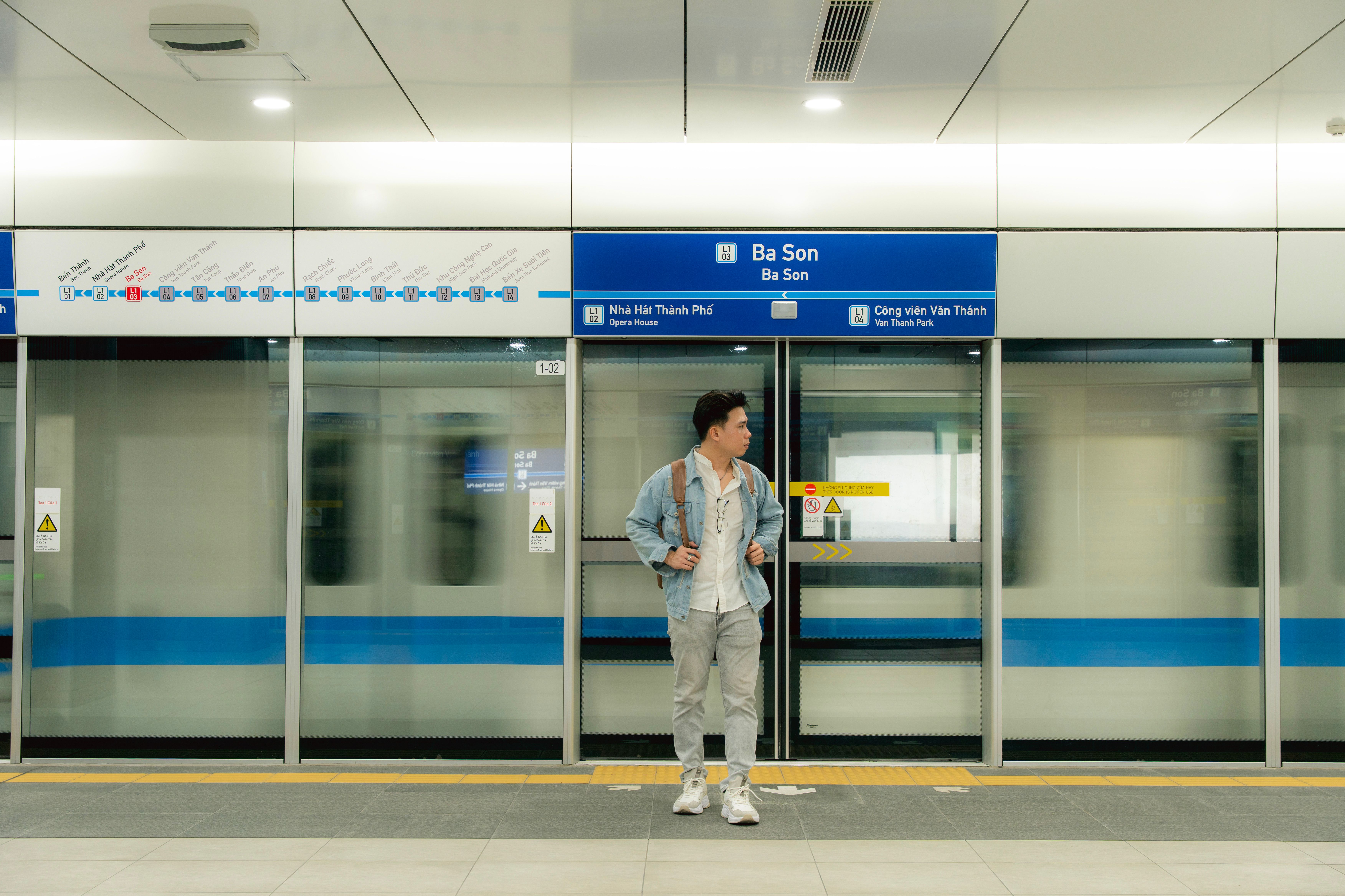 Man Waiting at Ba Son Metro Station · Free Stock Photo