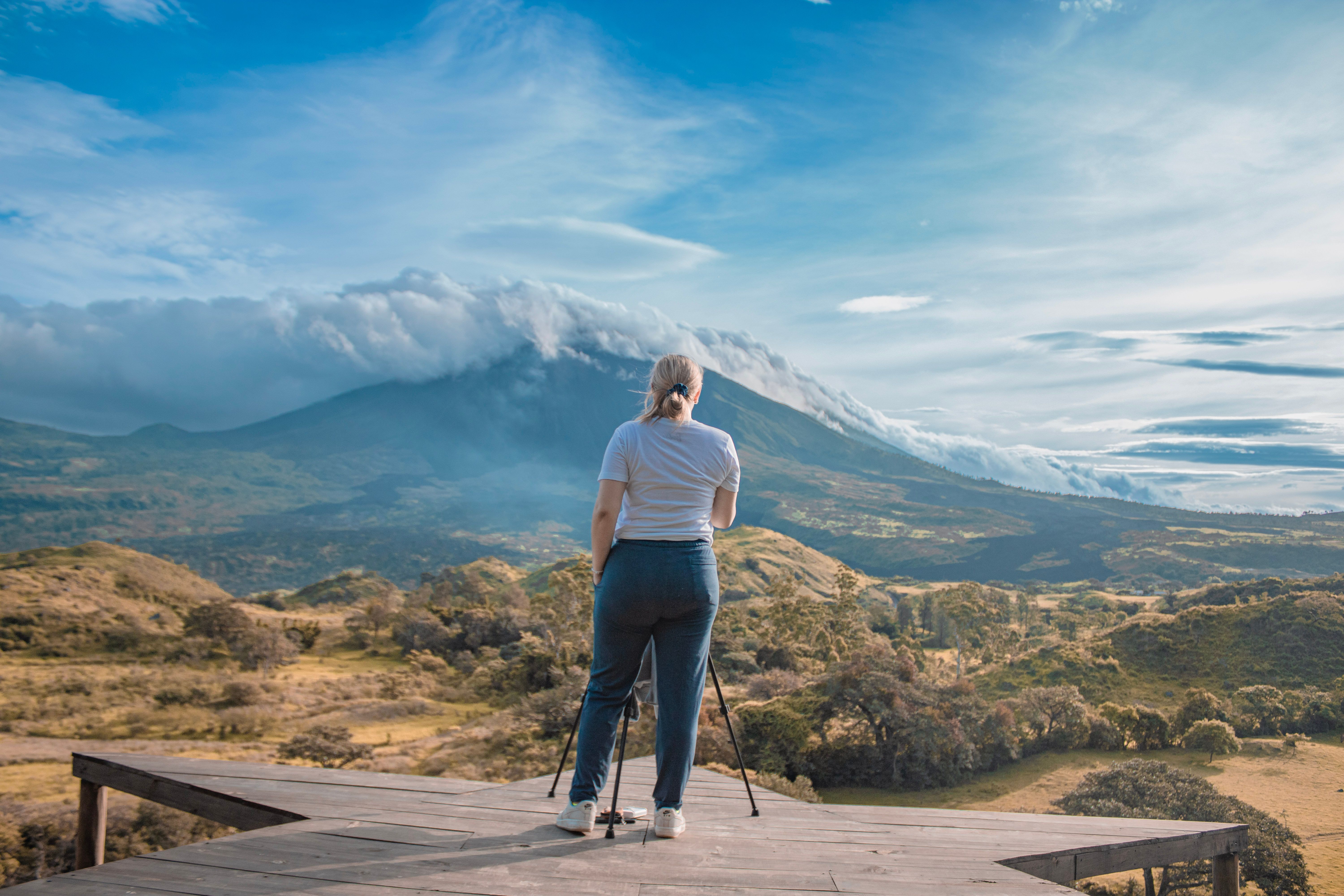 Woman Observing Volcano in Guatemala's Landscape · Free Stock Photo