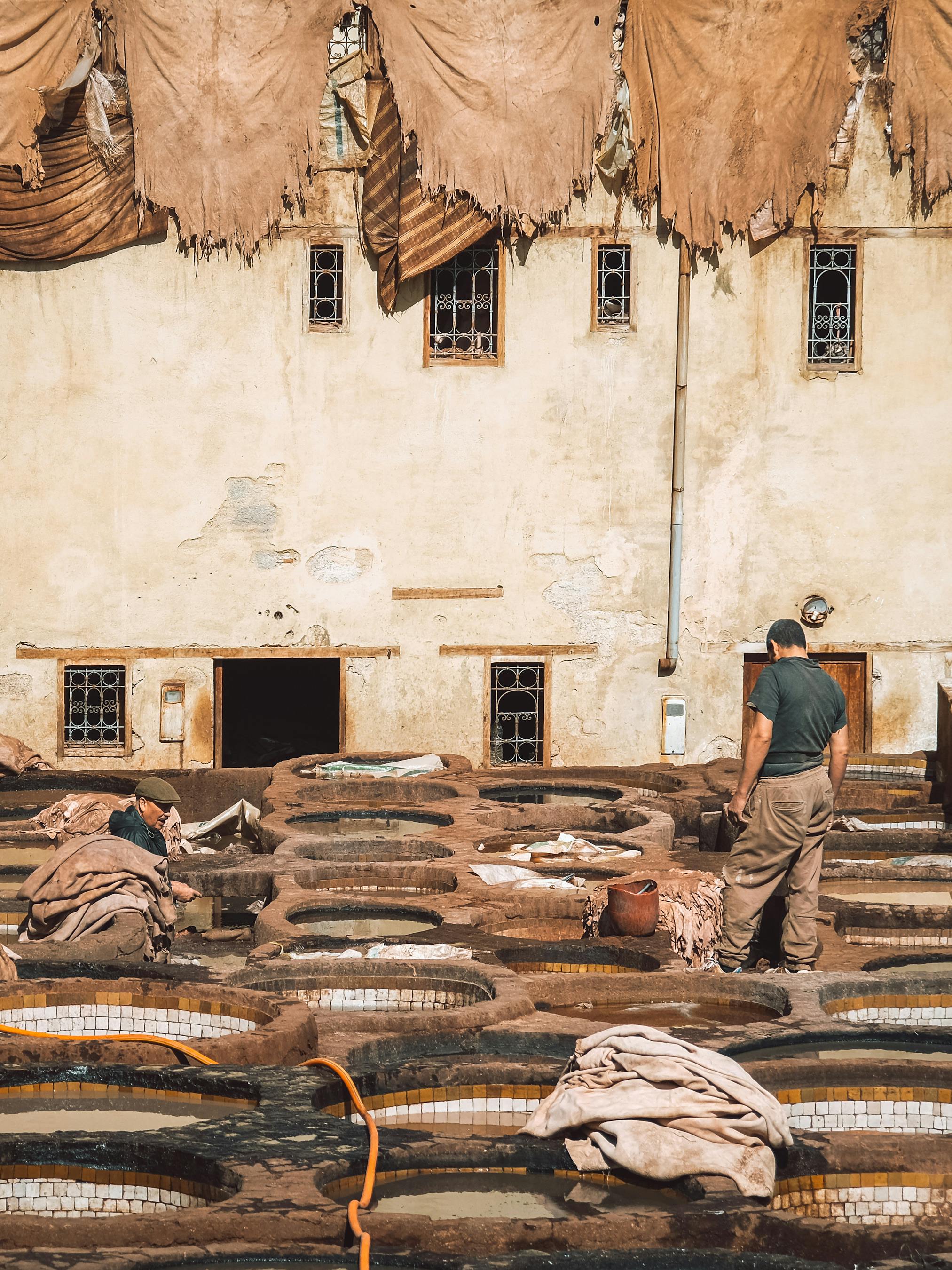 Traditional Tannery Workers at Leather Pits · Free Stock Photo