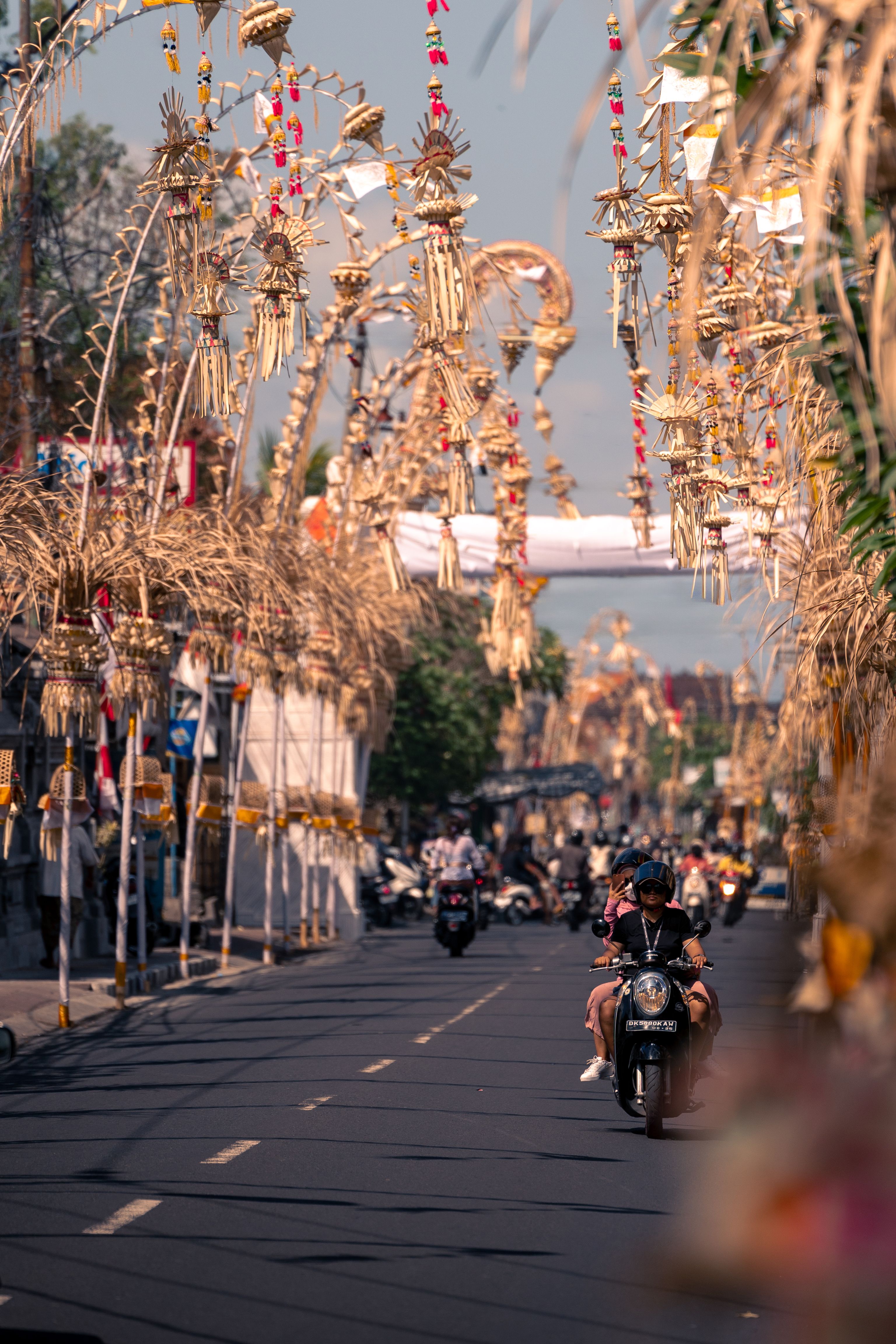 Balinese Street Adorned with Penjor Decorations · Free Stock Photo