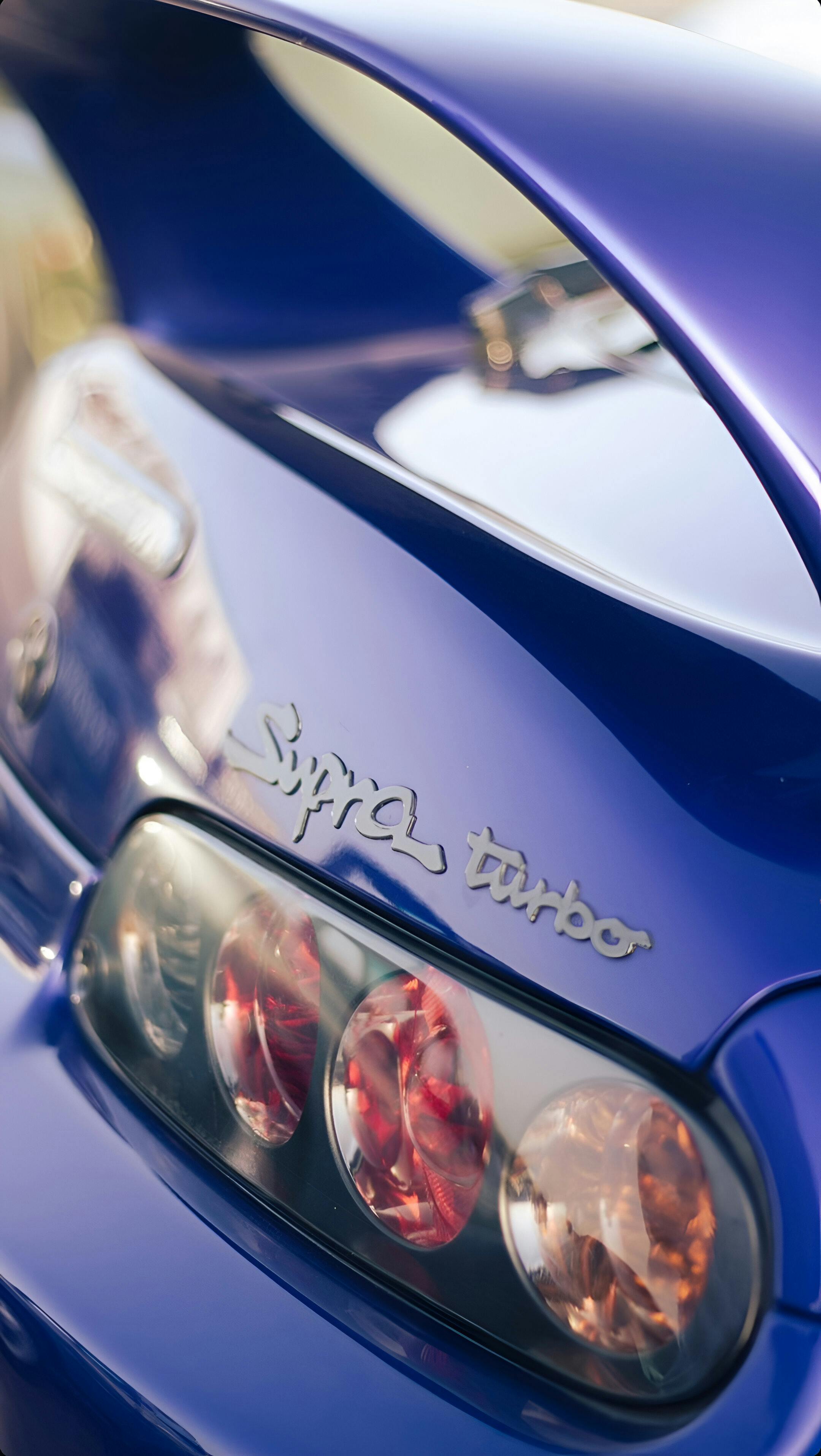 Close-Up of Blue Toyota Supra Turbo Tail Lights · Free Stock Photo