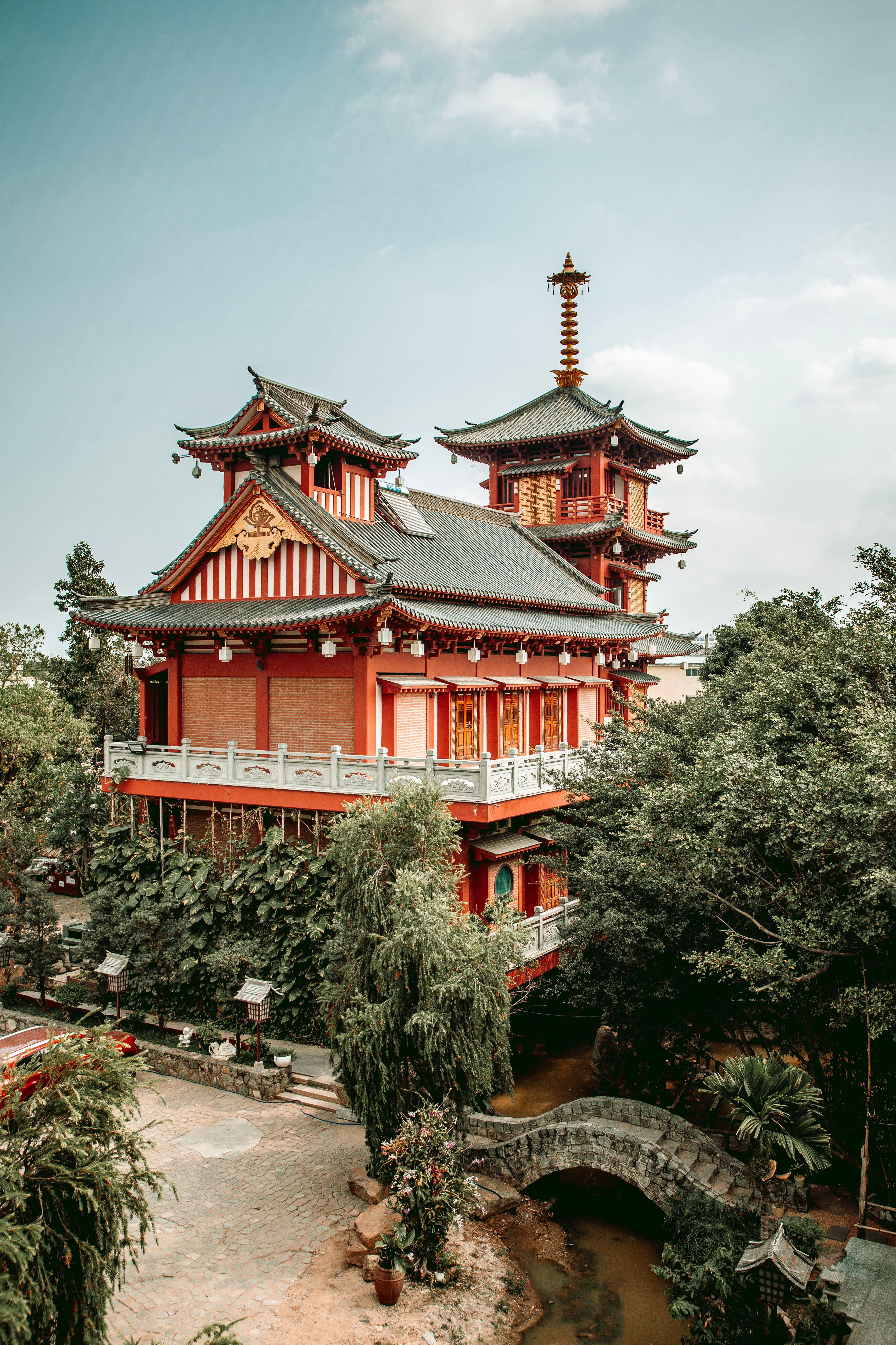Traditional Asian Temple with Lush Surroundings · Free Stock Photo