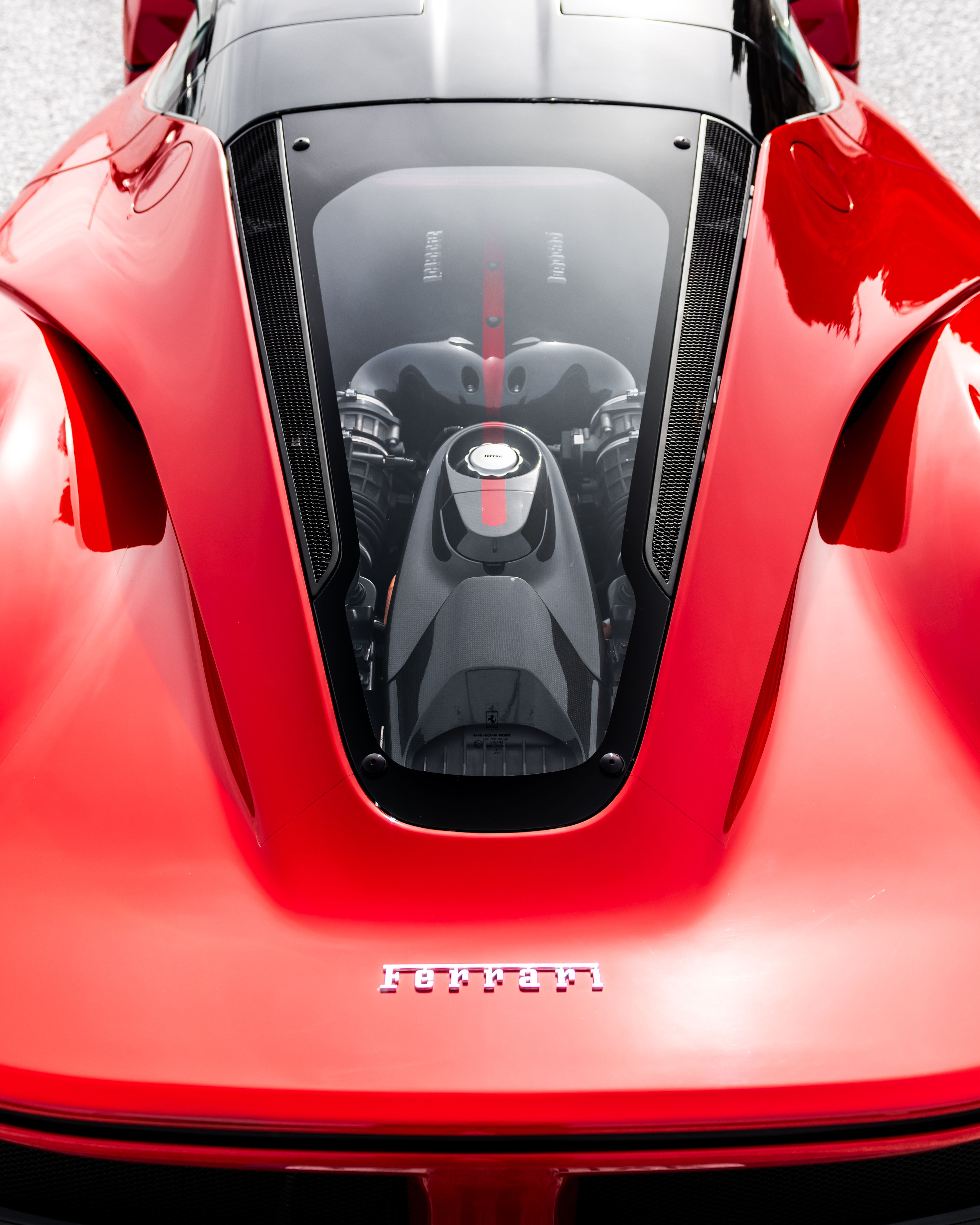 Sleek Red Sports Car with Visible Engine · Free Stock Photo