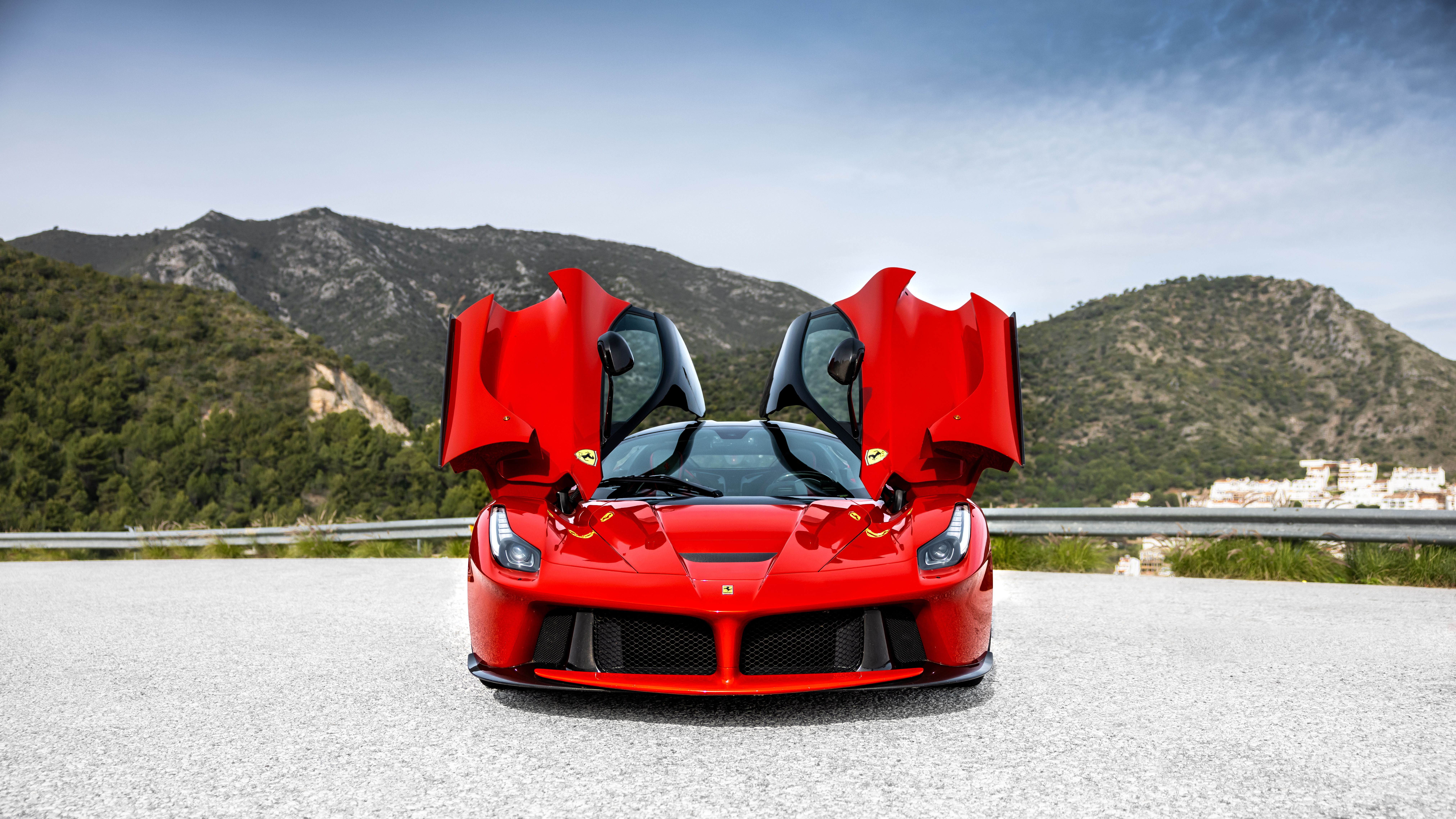 Red Sports Car with Iconic Gullwing Doors Outdoors · Free Stock Photo