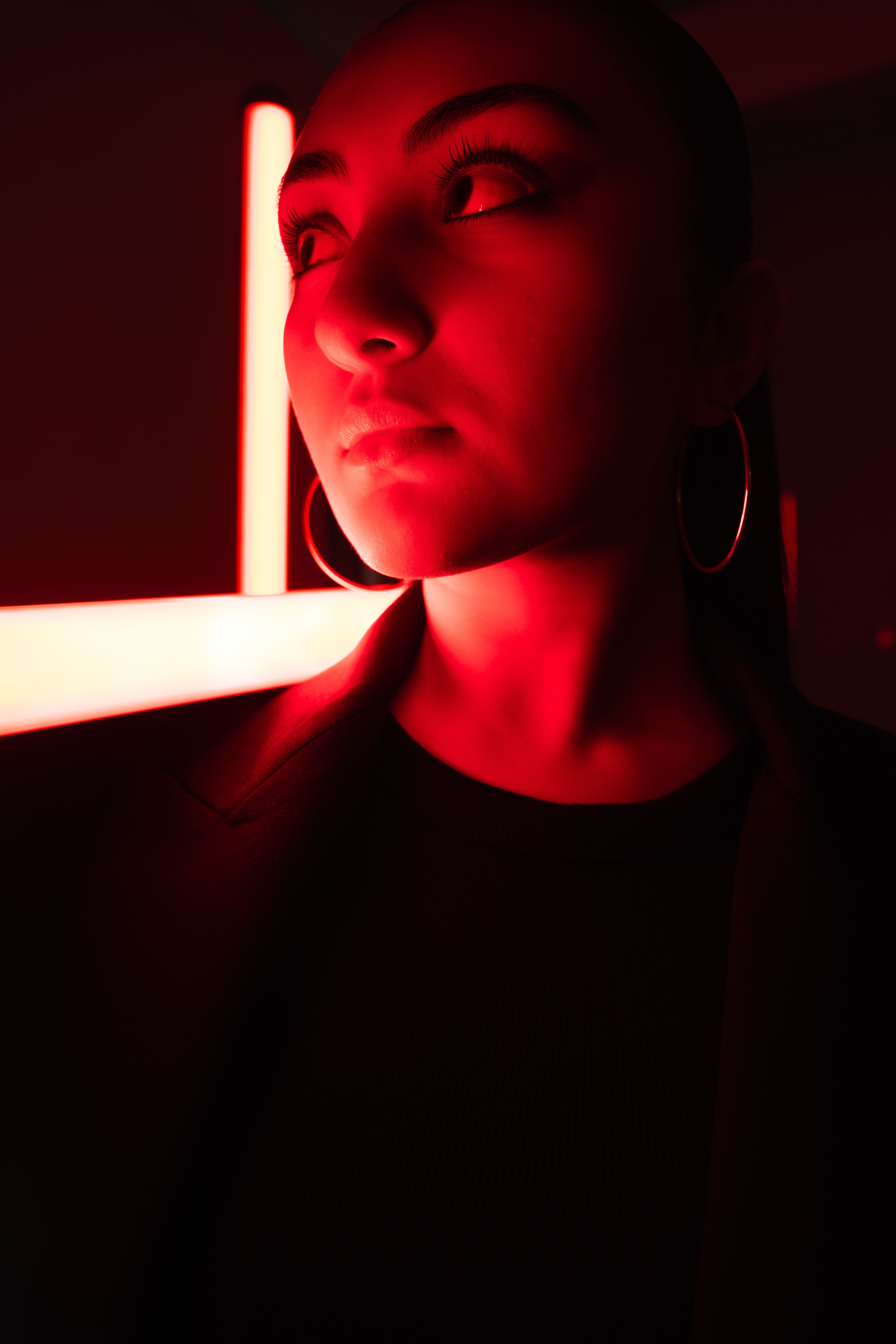 Dramatic Neon Portrait with Red Lighting · Free Stock Photo