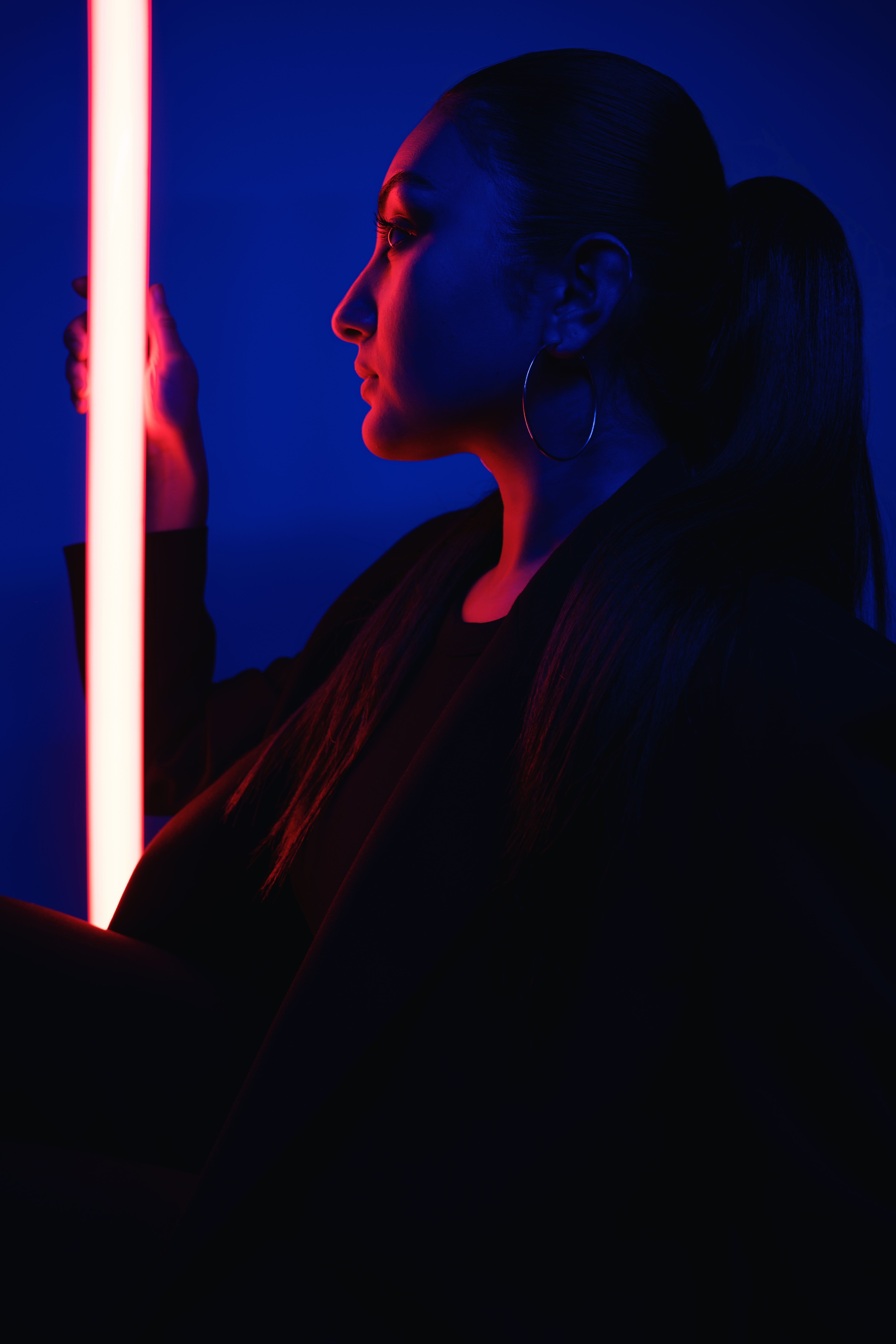 Neon Portrait of Woman with Dramatic Lighting · Free Stock Photo