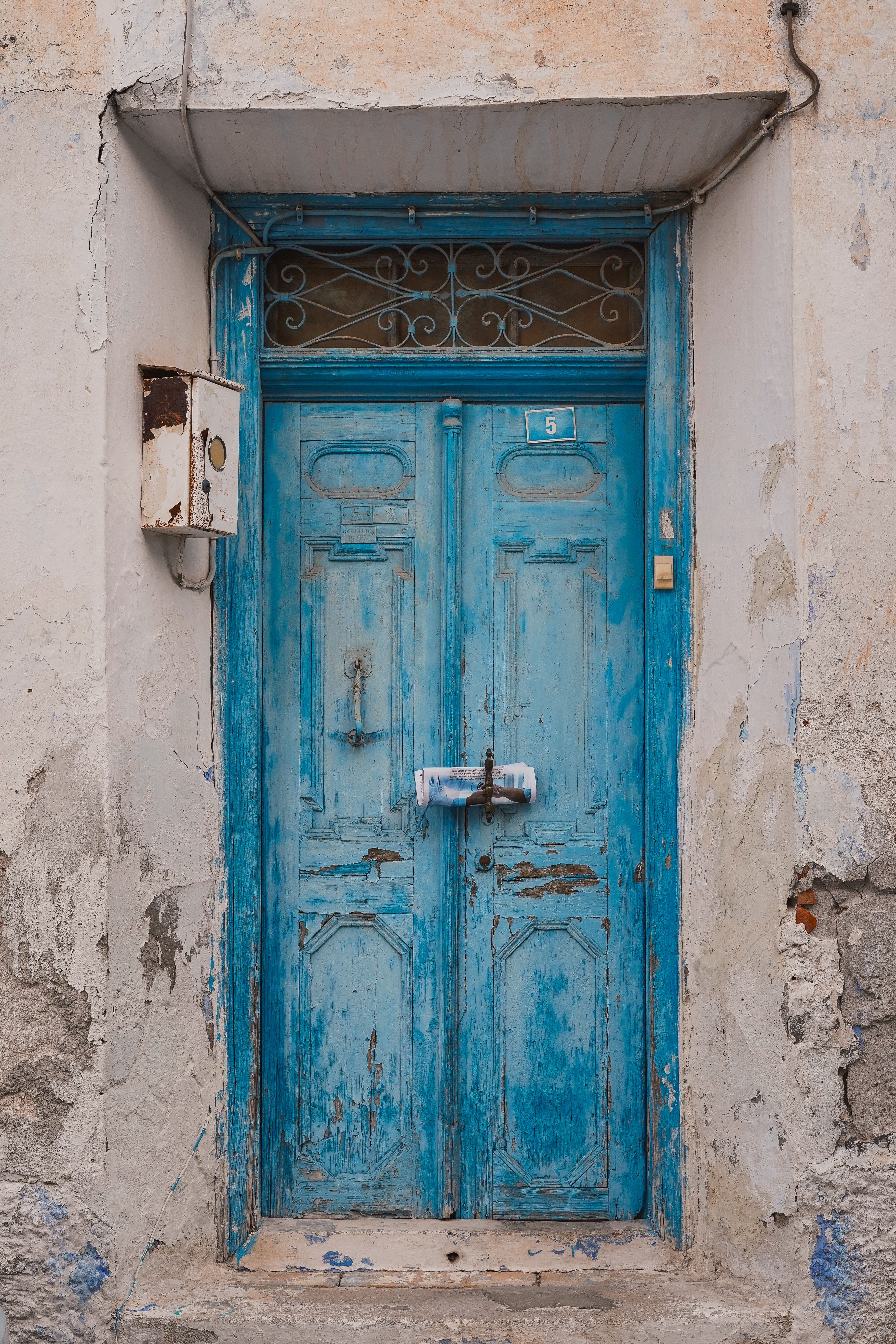 Weathered Blue Door in Rustic Urban Setting · Free Stock Photo